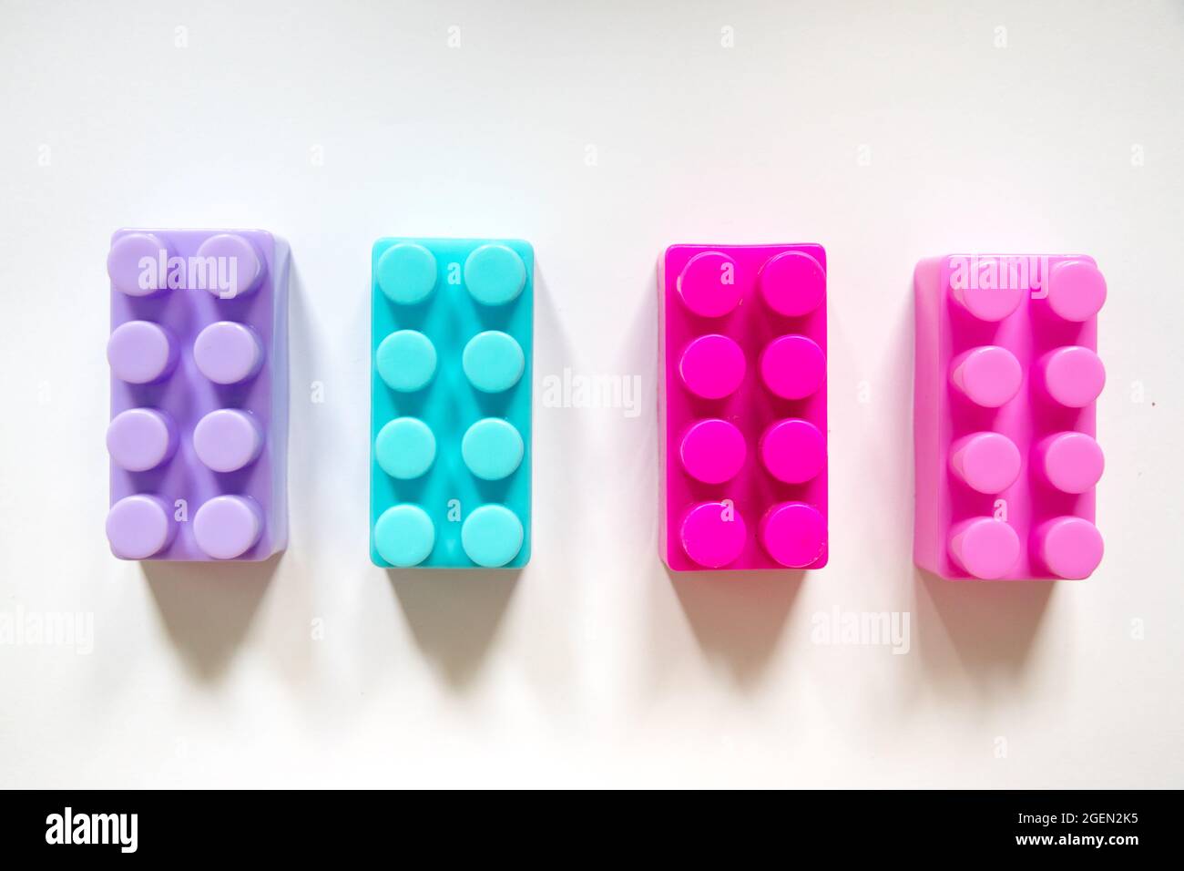 Multi color square plastic toy block on white background Stock Photo ...