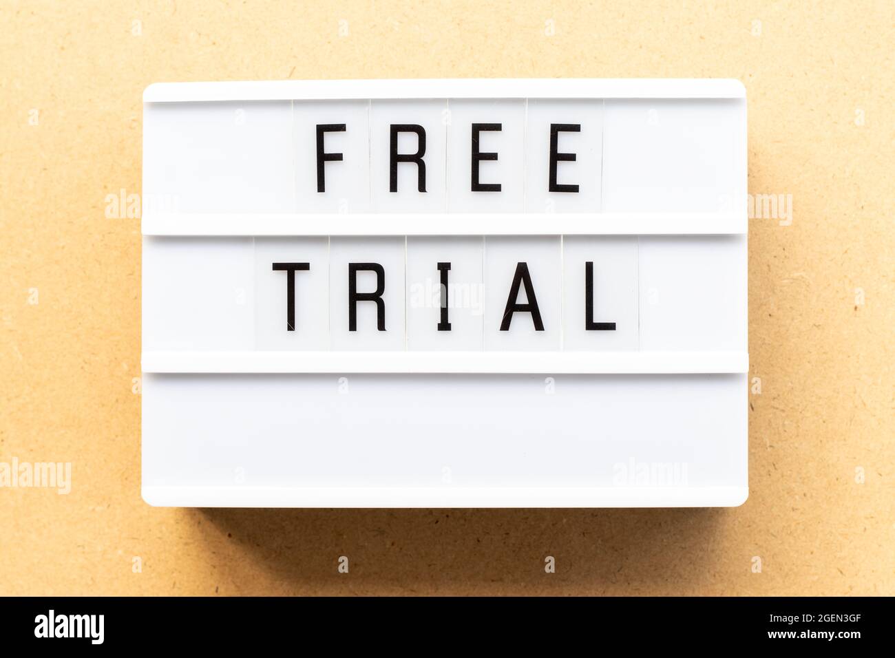 Light box with word free trial on wood background Stock Photo - Alamy