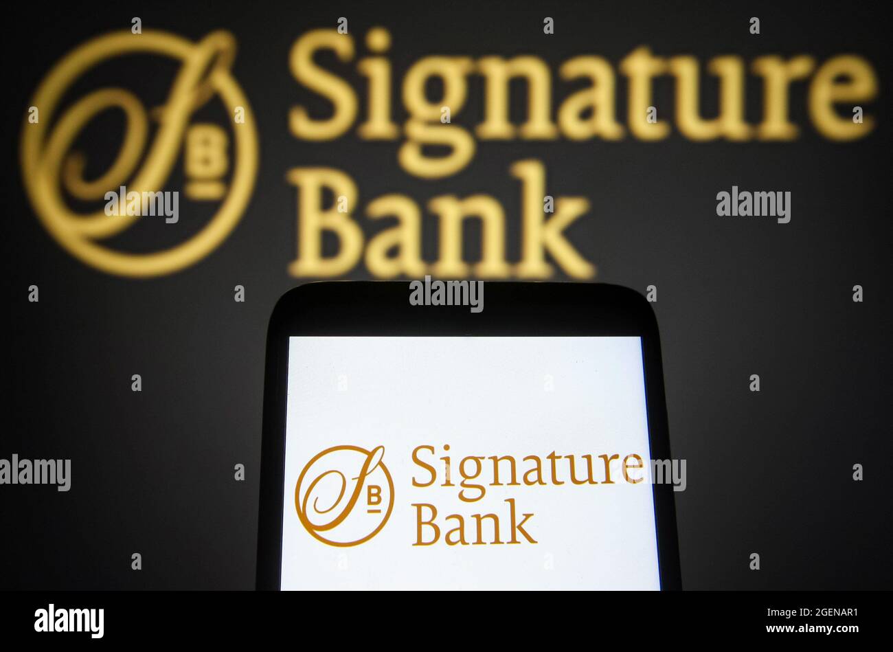 In this photo illustration, Signature Bank logo is seen displayed on a ...