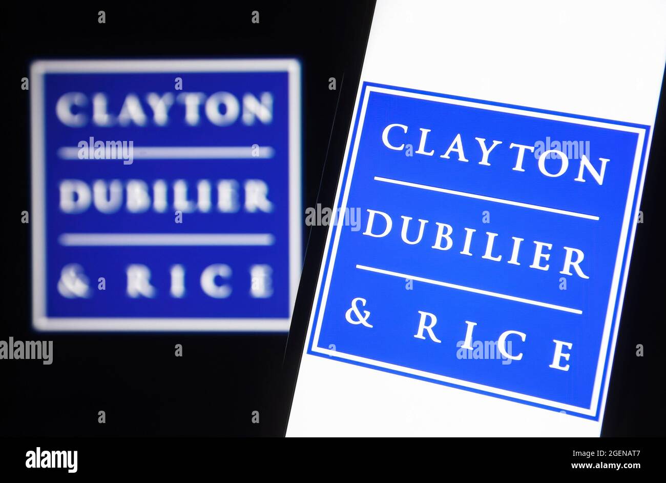 In this photo illustration, Clayton, Dubilier & Rice (CD&R) logo is ...