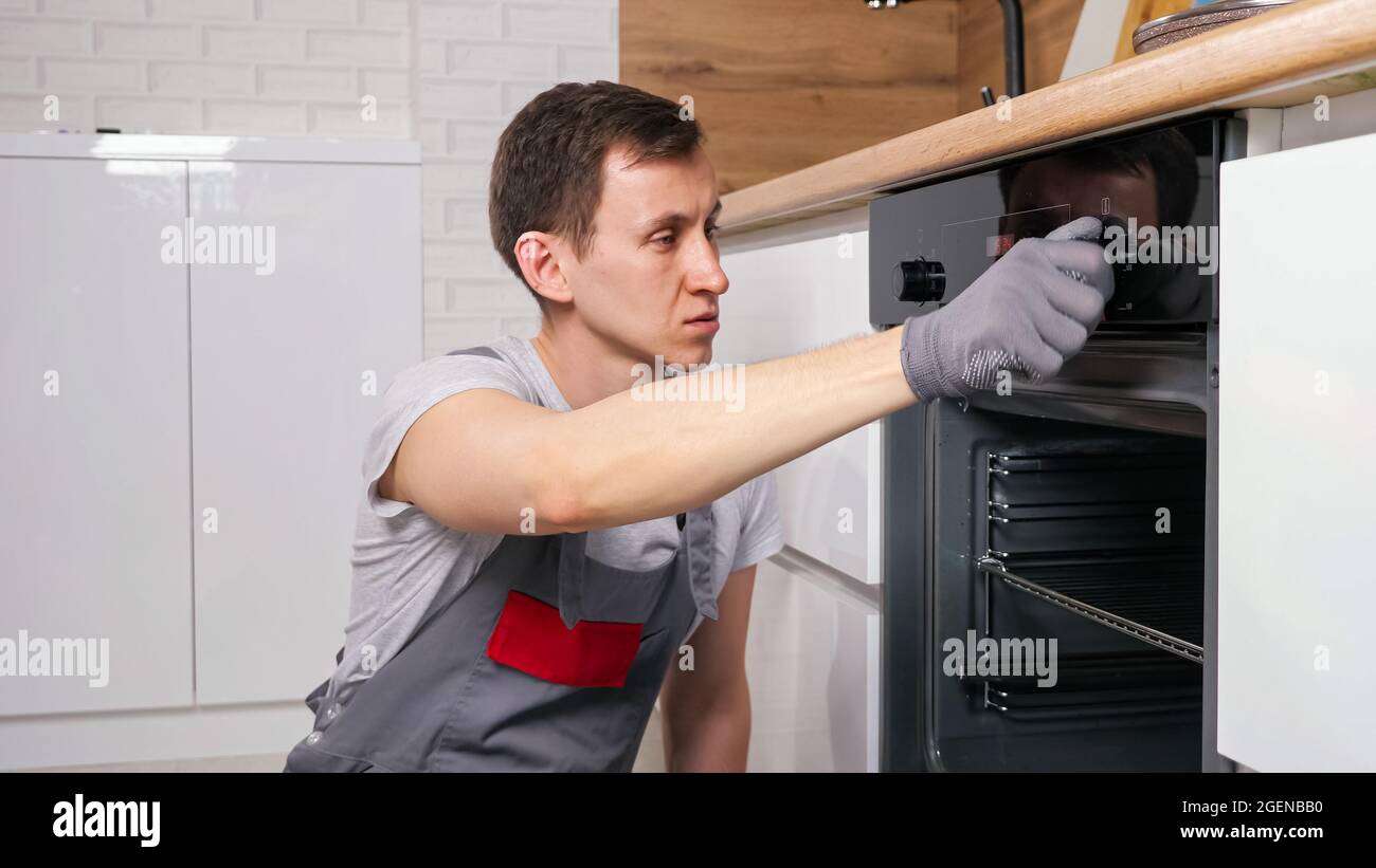 Broken oven hi-res stock photography and images - Alamy