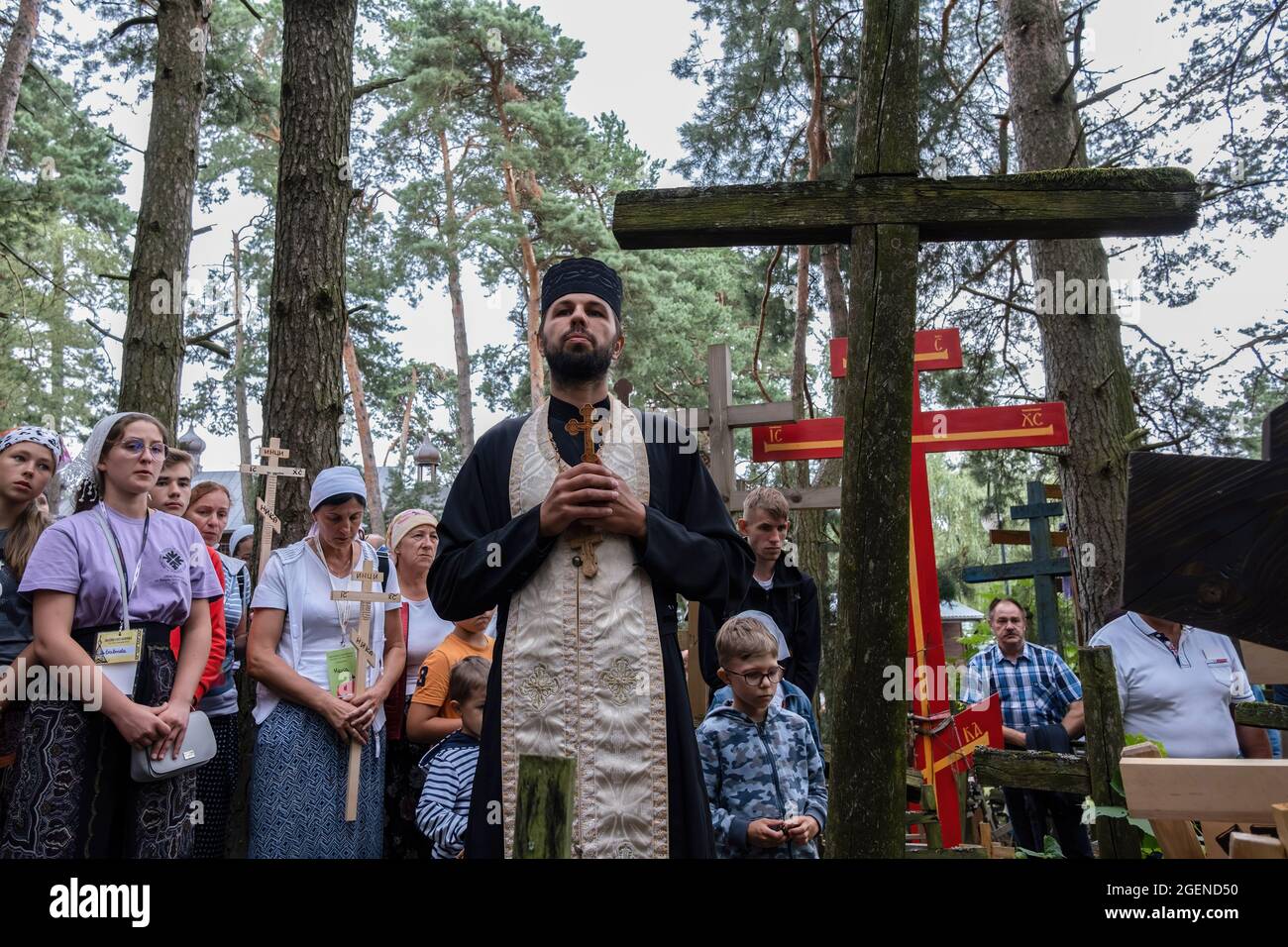 An orthodox priest seen praying with believers in celebration of the ...