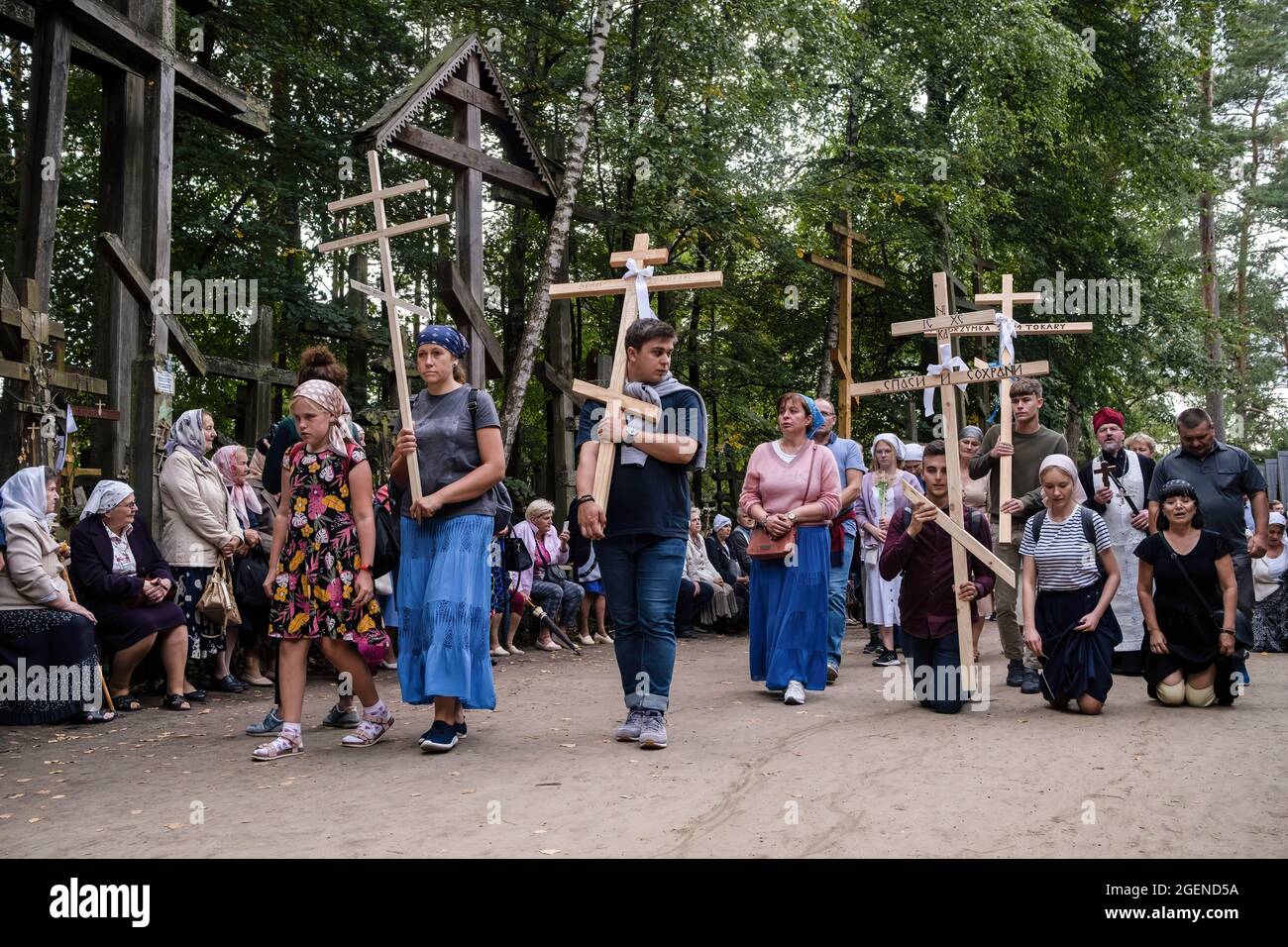 Believers walk with crosses and religious symbols, during the ...