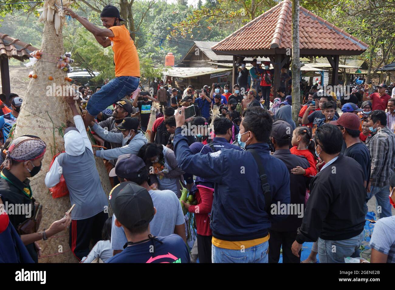 Crowded people celebrating sedekah bumi (javanese thanksgiving) in ...