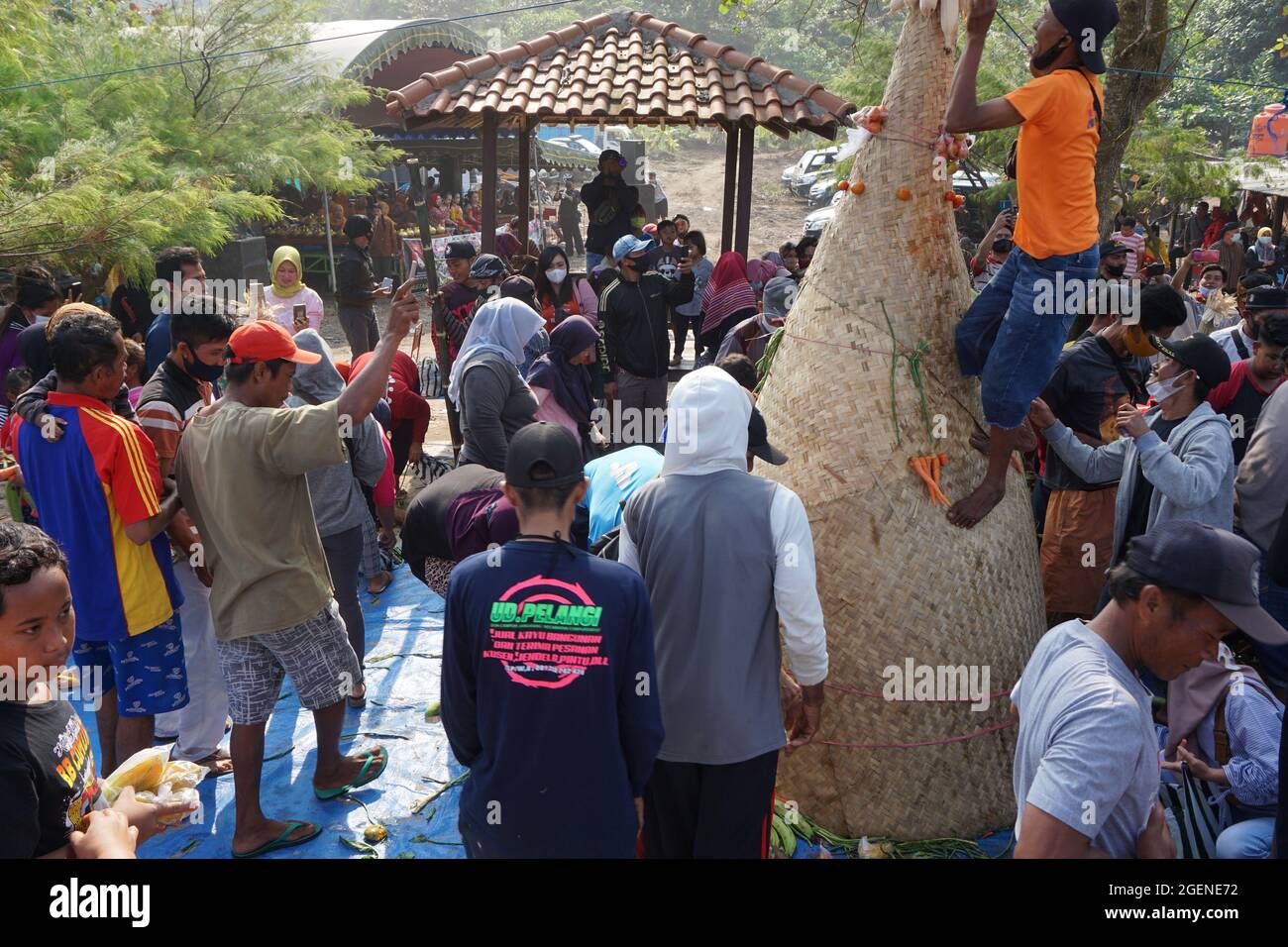 Crowded people celebrating sedekah bumi (javanese thanksgiving) in ...