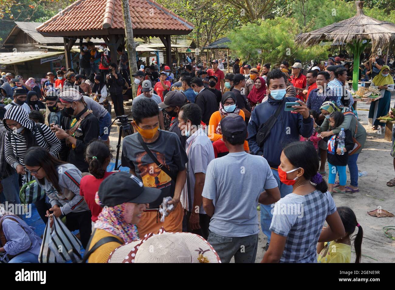 Crowded people celebrating sedekah bumi (javanese thanksgiving) in ...