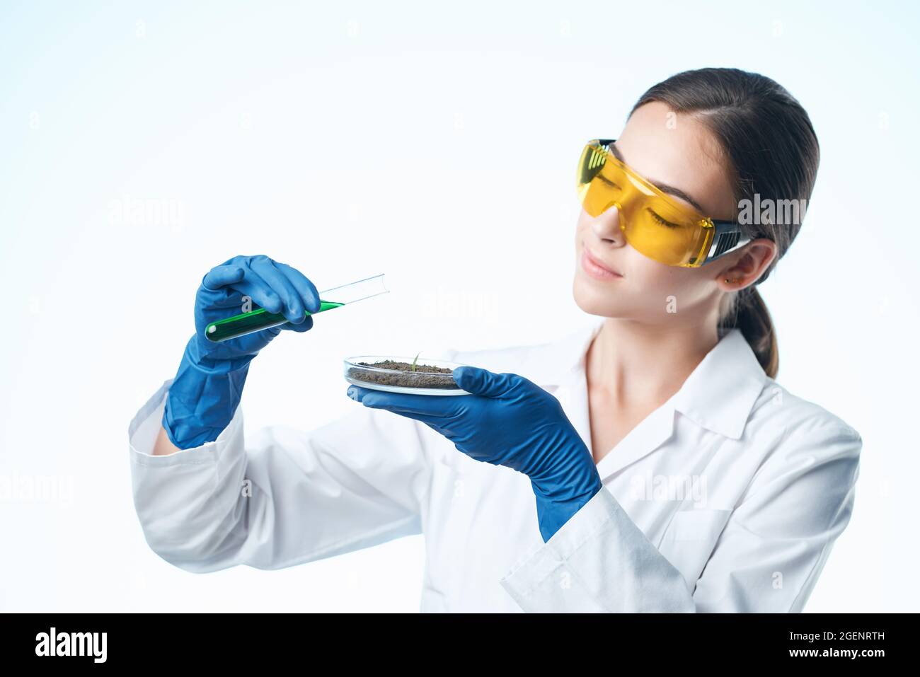 female laboratory assistant in a white coat soil research biology Stock ...