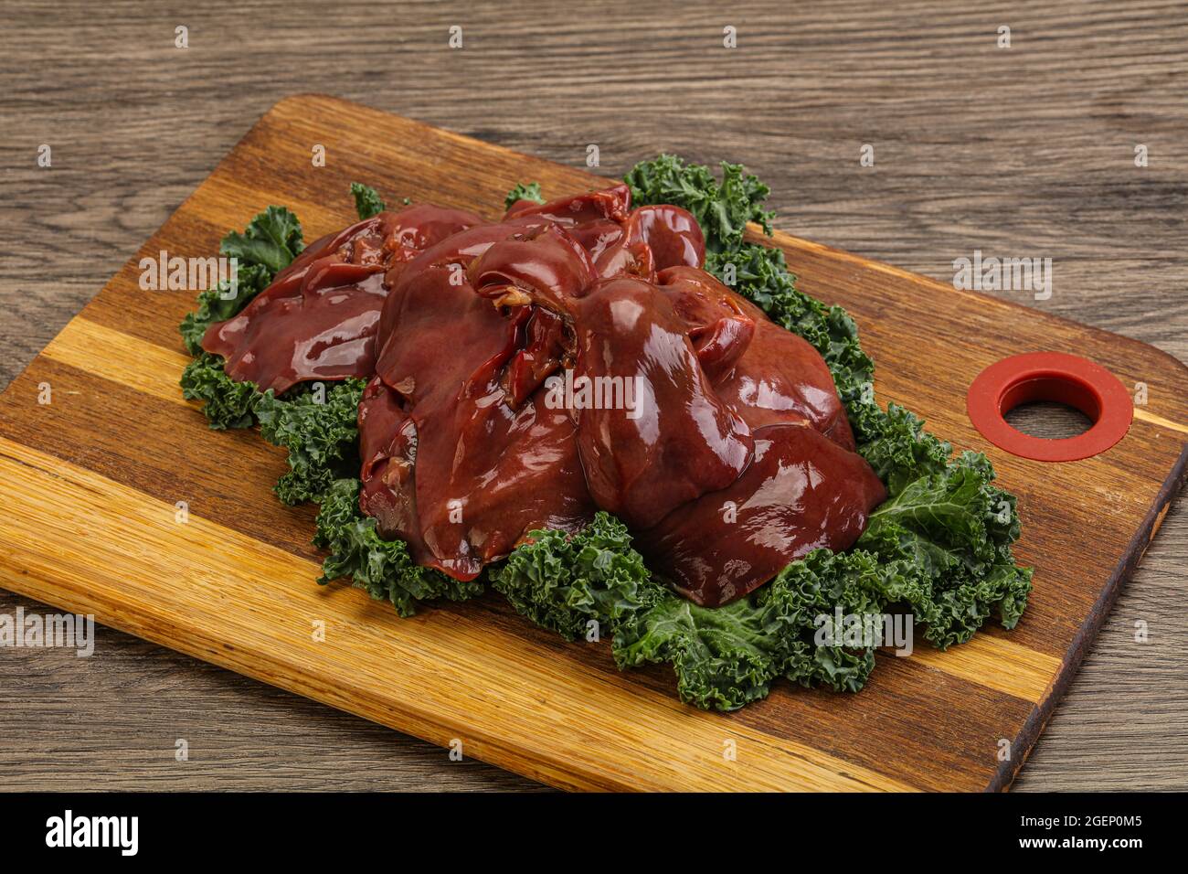 Raw chicken liver over board for cooking Stock Photo - Alamy
