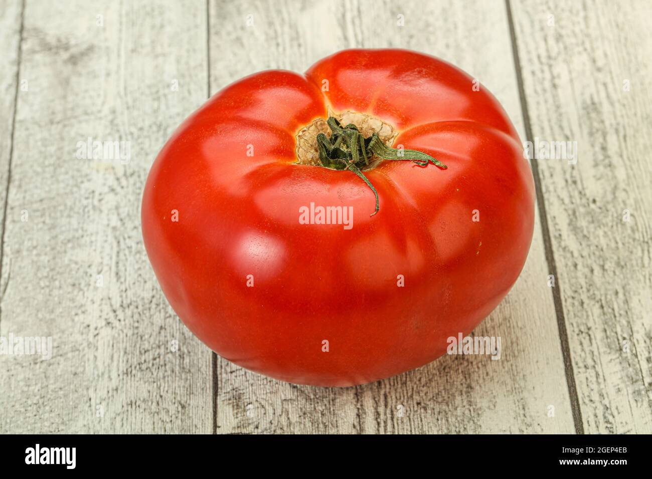 Ripe big juicy red tomato for cooking Stock Photo - Alamy