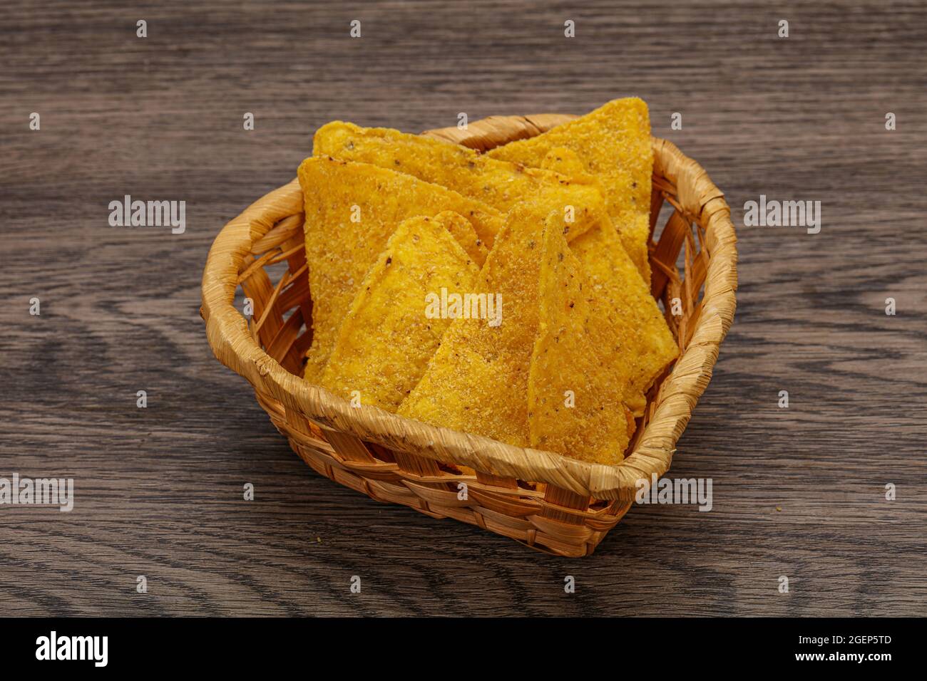 Mexican crunchy corn nachos triangle heap Stock Photo - Alamy