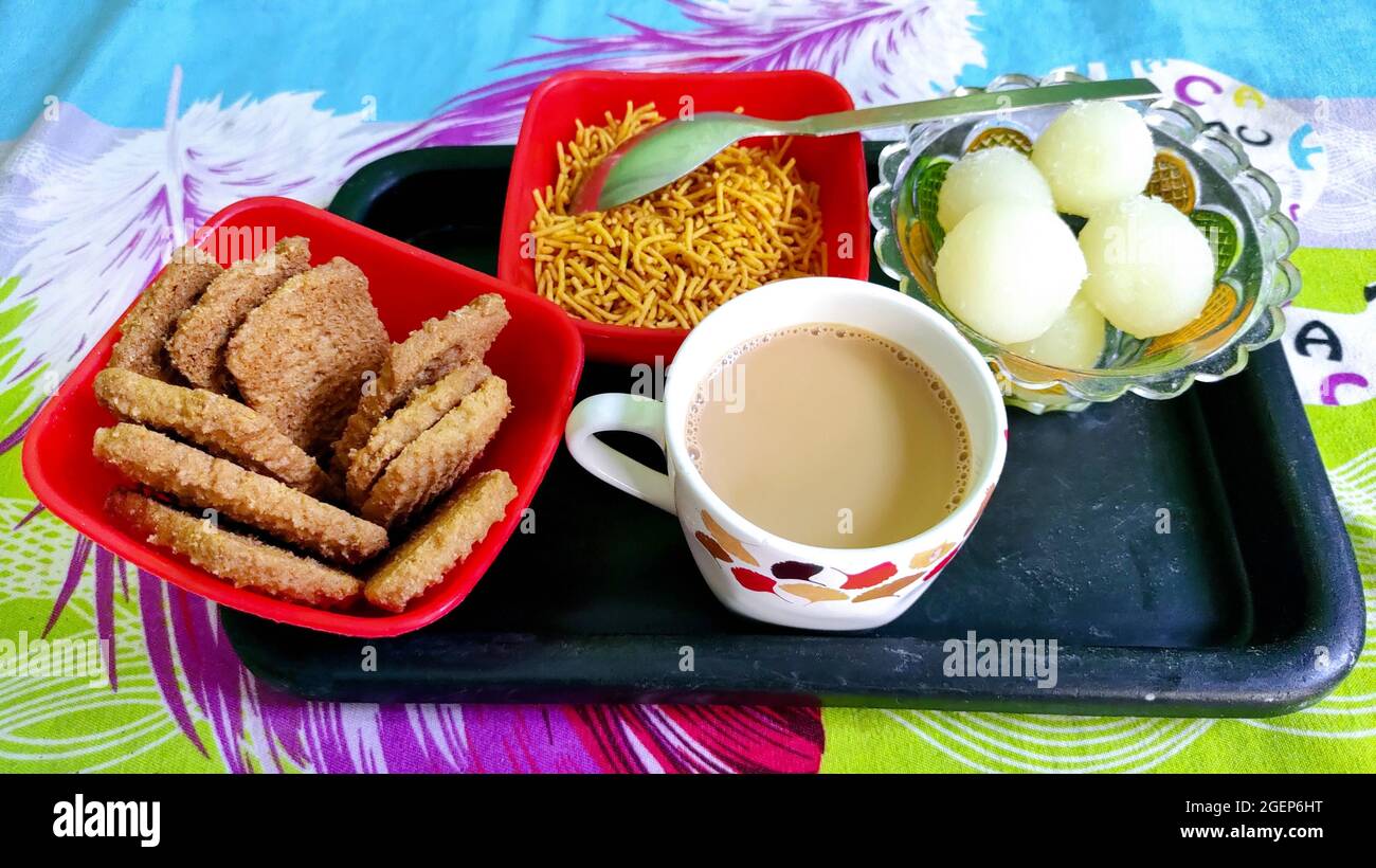 Tea And Snacks With Sweets For Guests In India Stock Photo Alamy tea-and-snacks-with-sweets-for-guests-in-india-stock-photo-alamy