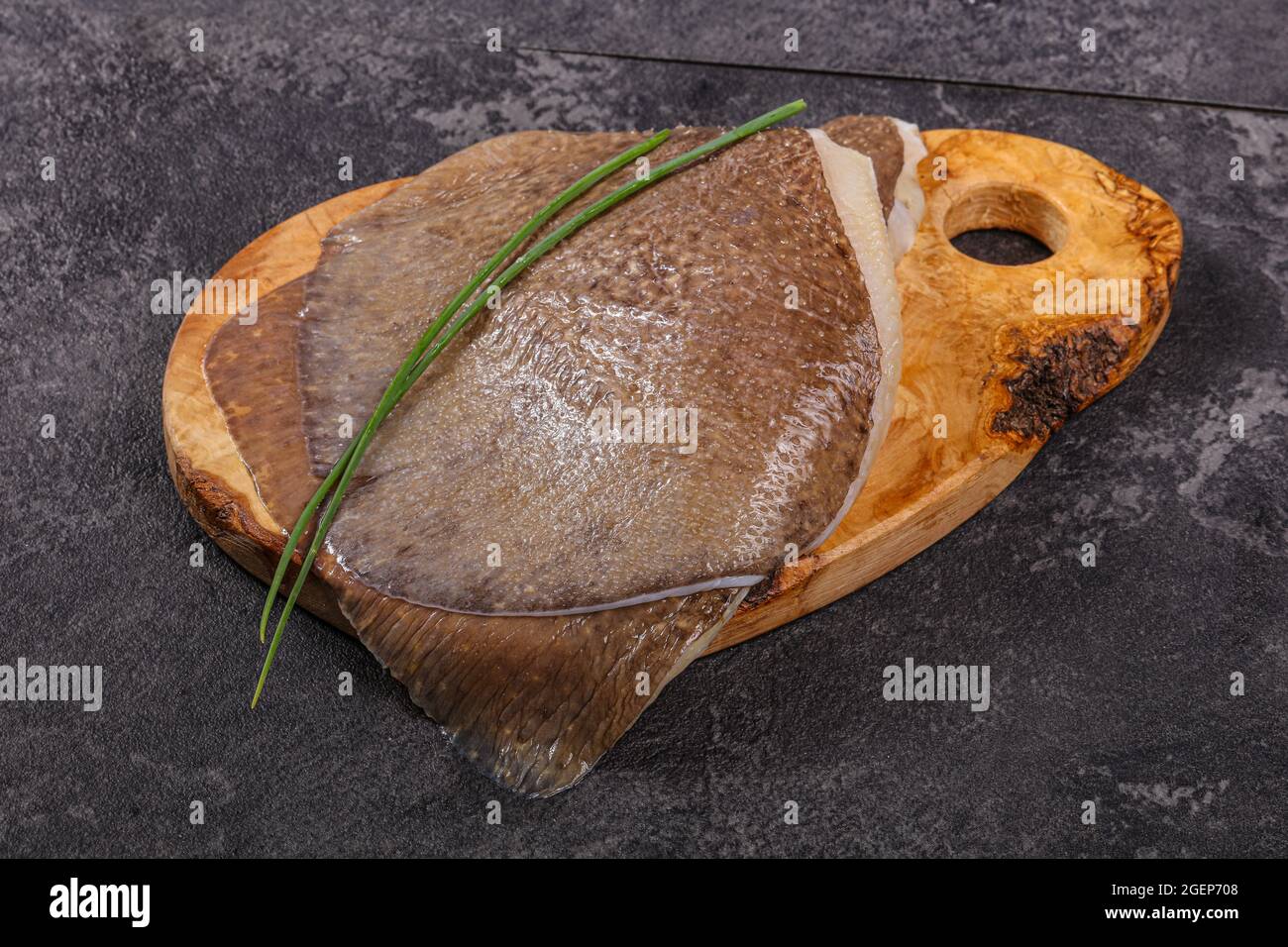 Raw stingray wings tasty fillet for cooking Stock Photo - Alamy