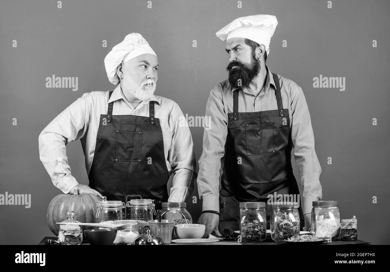 Homemade meal. Father and son culinary hobby. Family restaurant. Mature ...