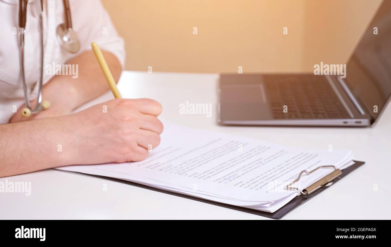 Lady medical professional works papers hi-res stock photography and ...