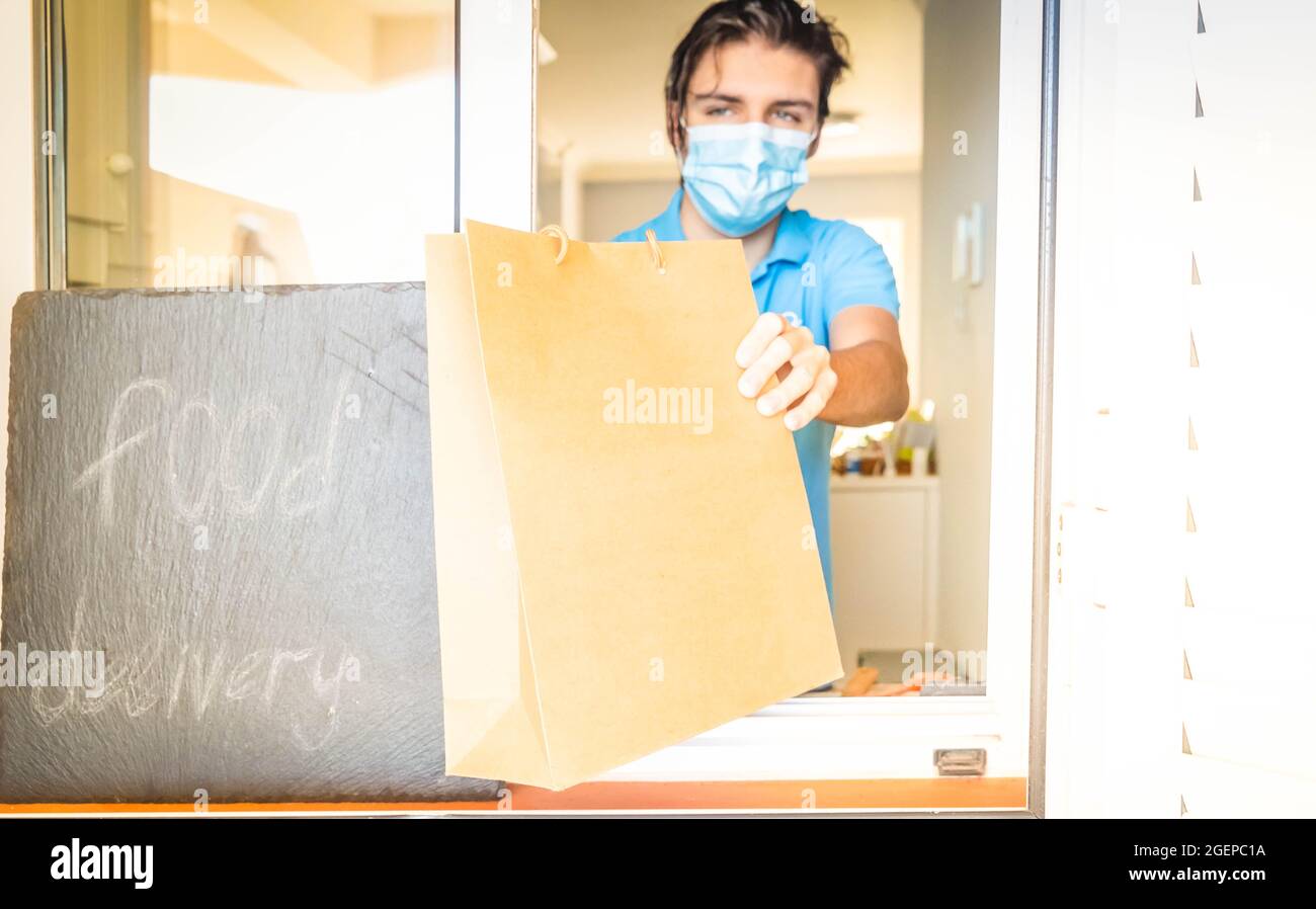 Take away food restaurant counter covid hi-res stock photography and ...