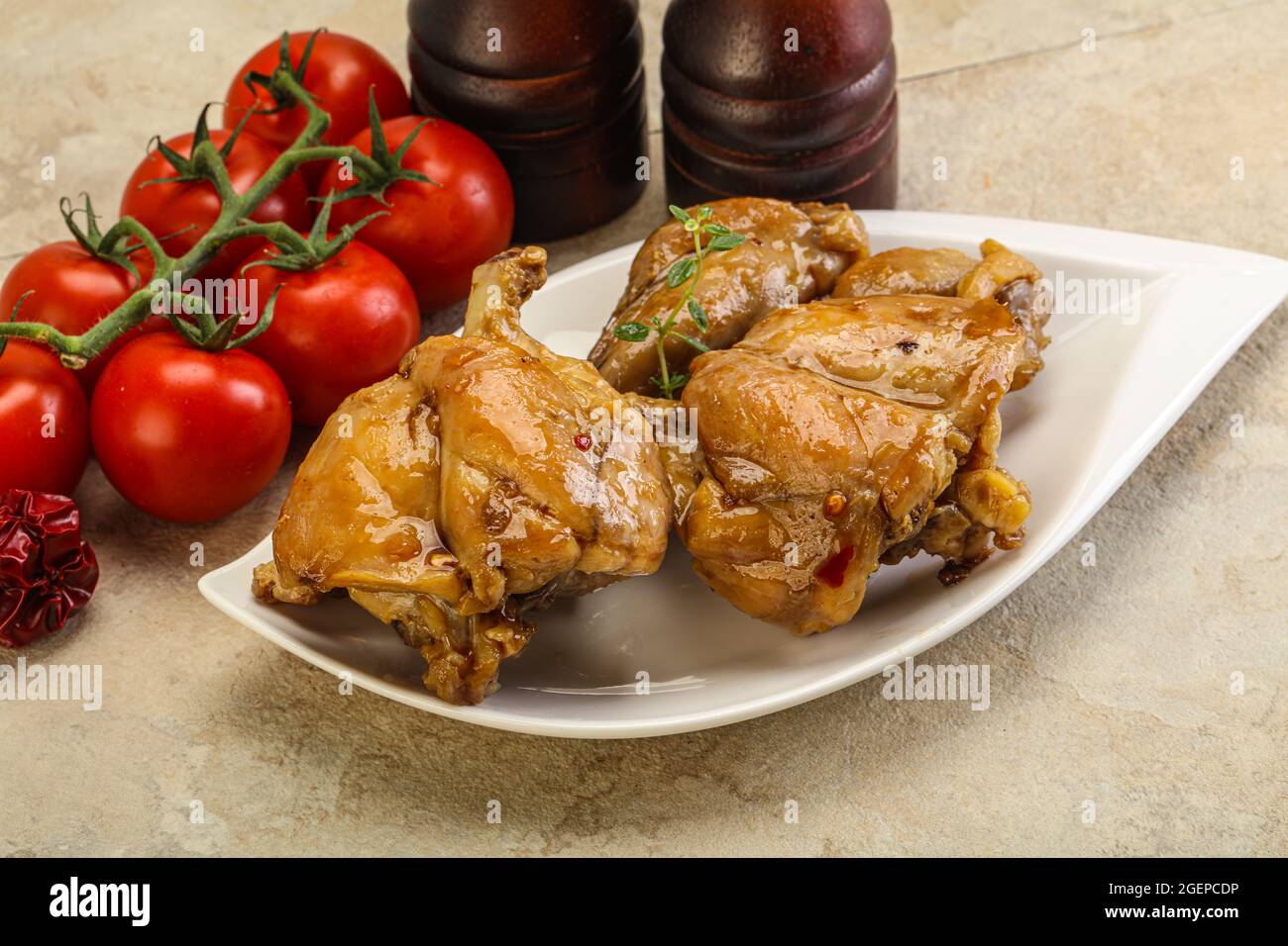 Rabbit stew in sweet and spicy sauce Stock Photo - Alamy
