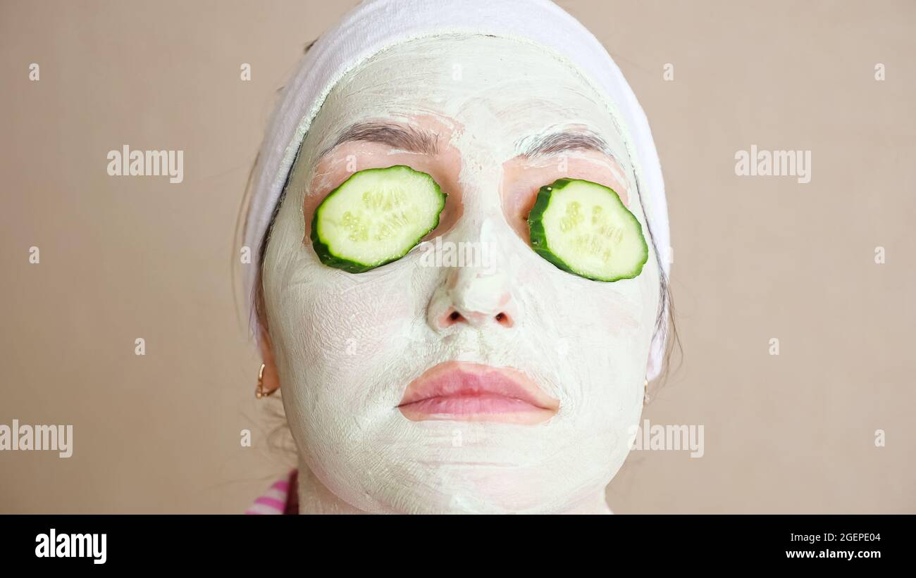 Woman with cucumber over eyes hi-res stock photography and images - Alamy
