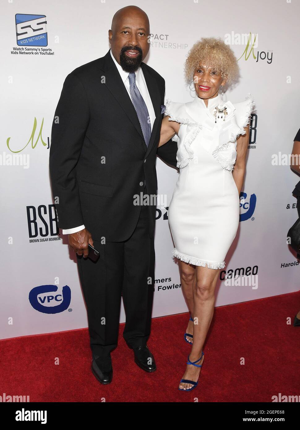 (L-R) Mike Woodson and Terri Woodson arrives at the 21st Annual Harold ...