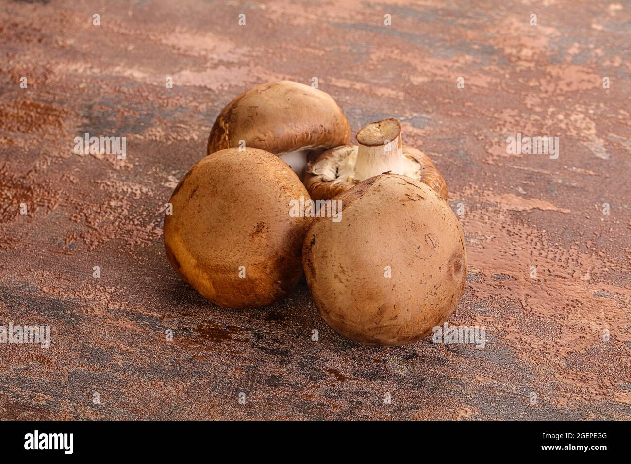 Raw brown champignons mushroom heap for cooking Stock Photo - Alamy