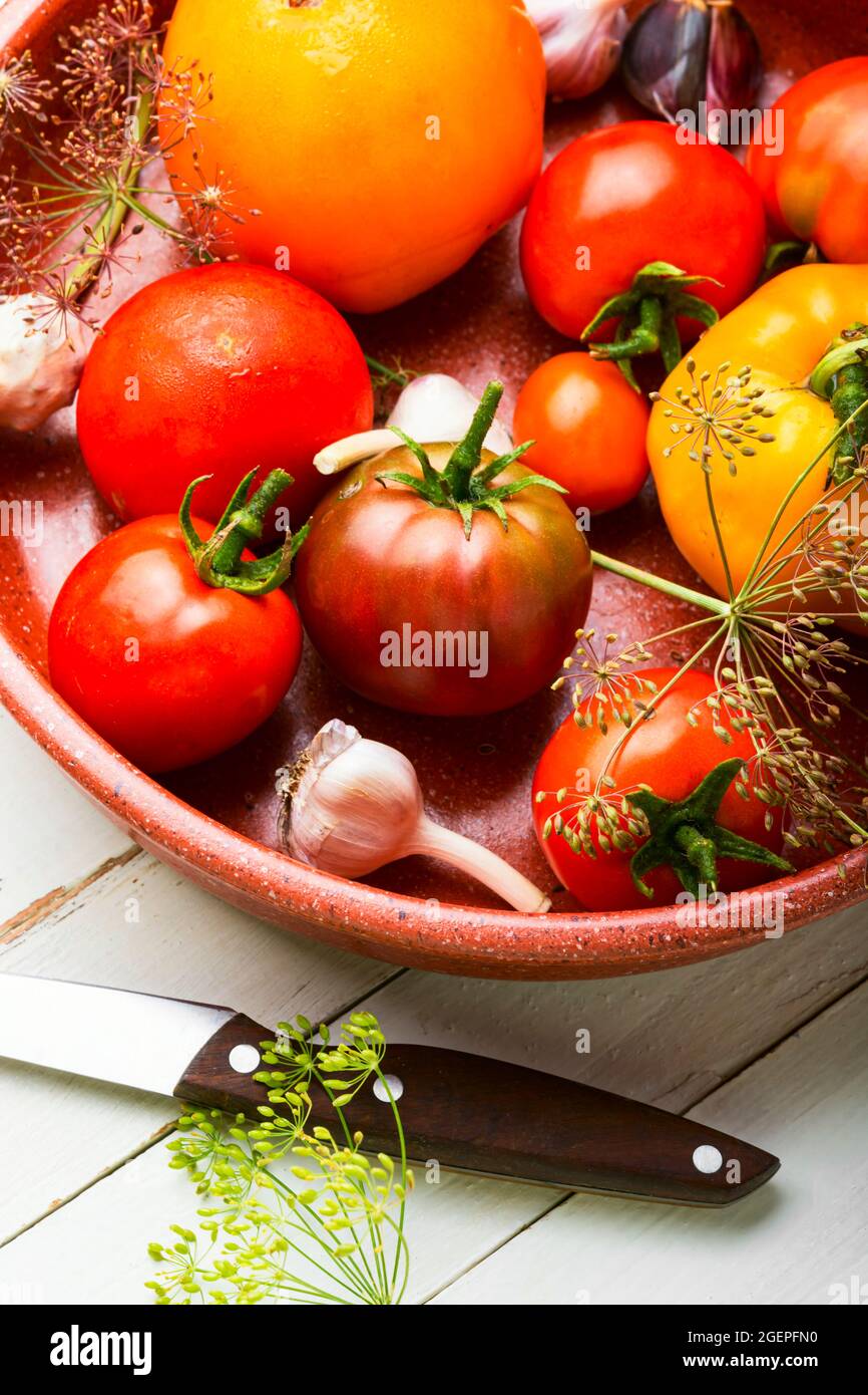 Salted homemade tomato.Cooking process.Canned tomato.Marinated ...