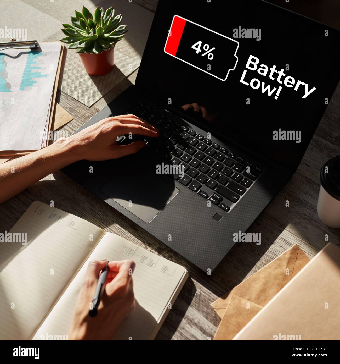 Battery low message on mobile device screen. Internet and technology ...