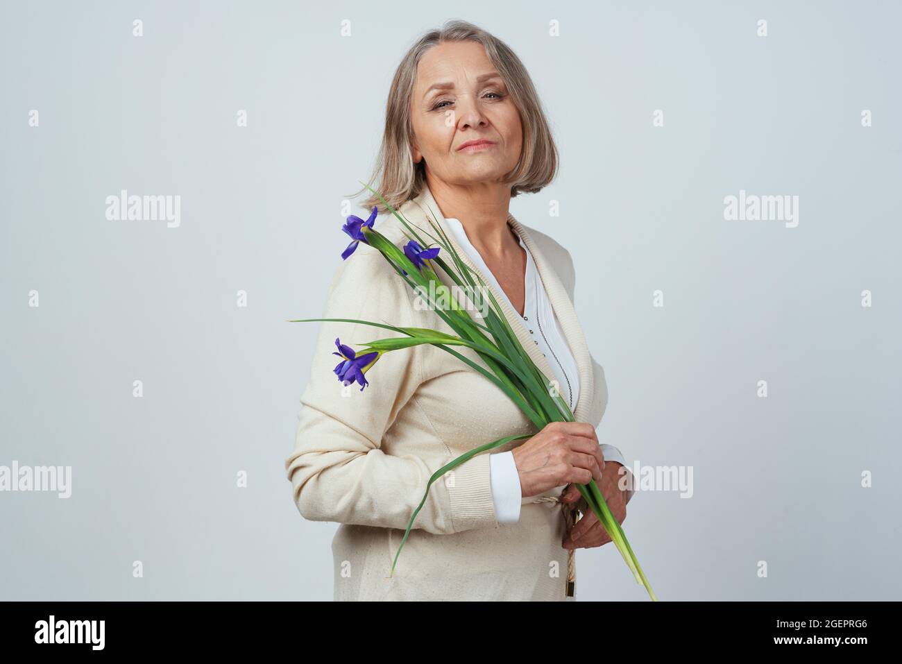 Older woman in dressing gown hi-res stock photography and images - Alamy