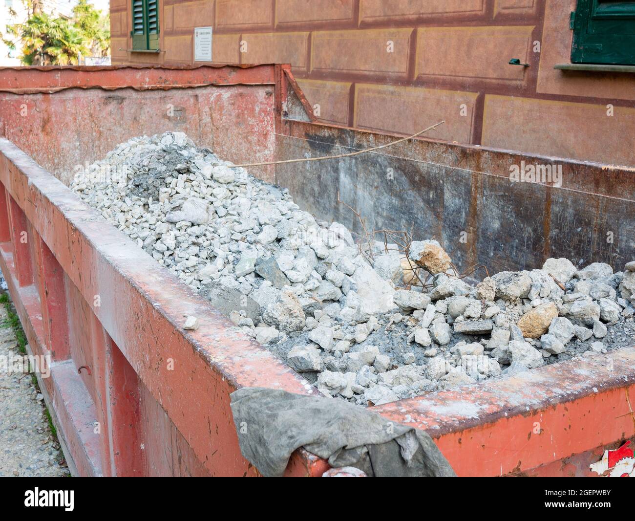 construction industry debris in a big dumpster container ready to be ...
