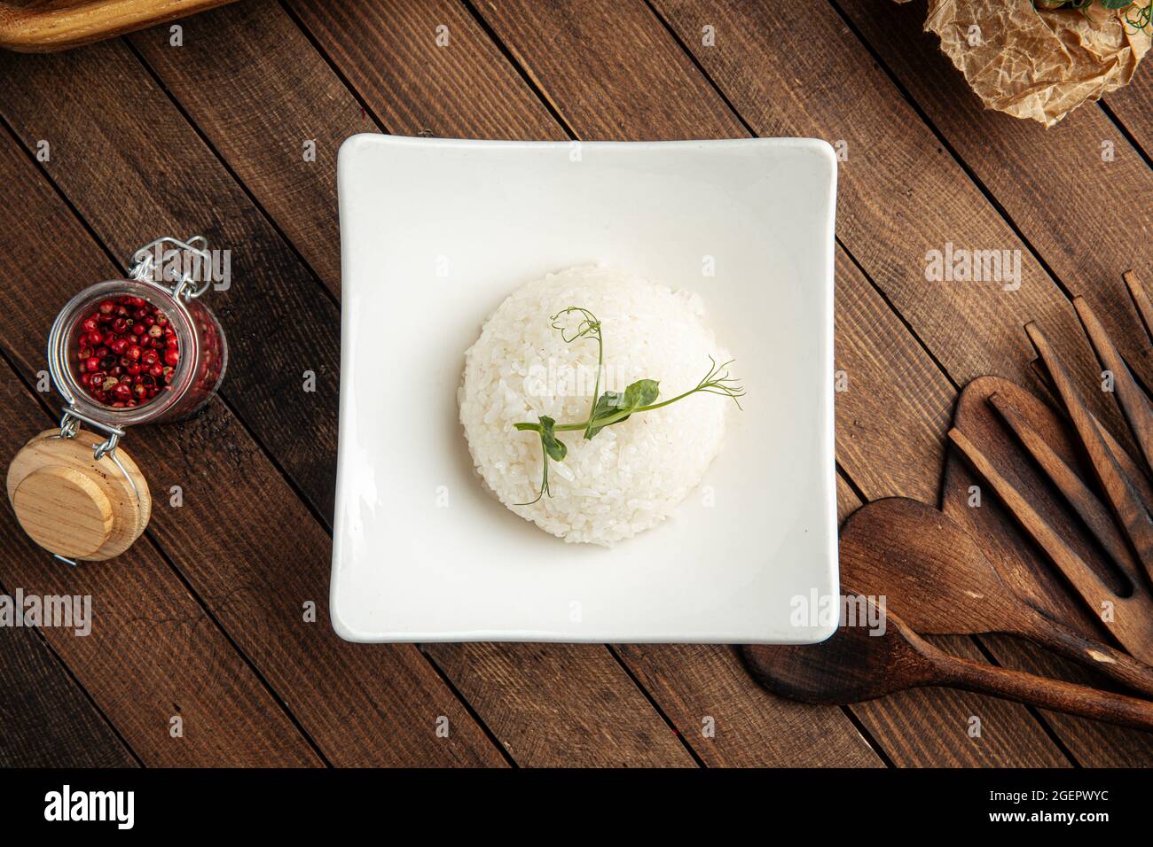 Plate of boiled white rice garnish portion Stock Photo - Alamy