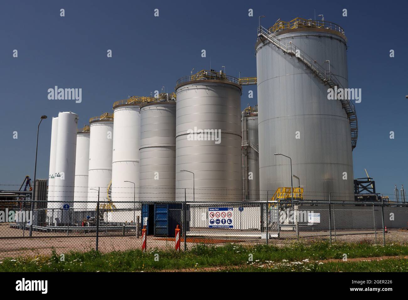 Oil storage tanks at the Rubiks terminal in the Botlek harbor in the ...