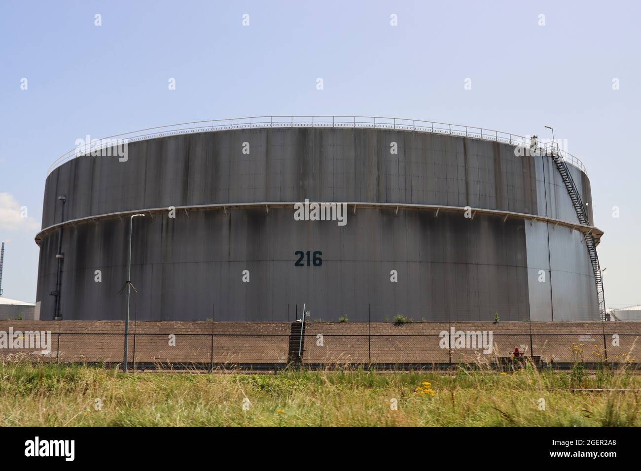 Oil storage tanks at the exxonmobil refinery in the Botlek harbor in ...