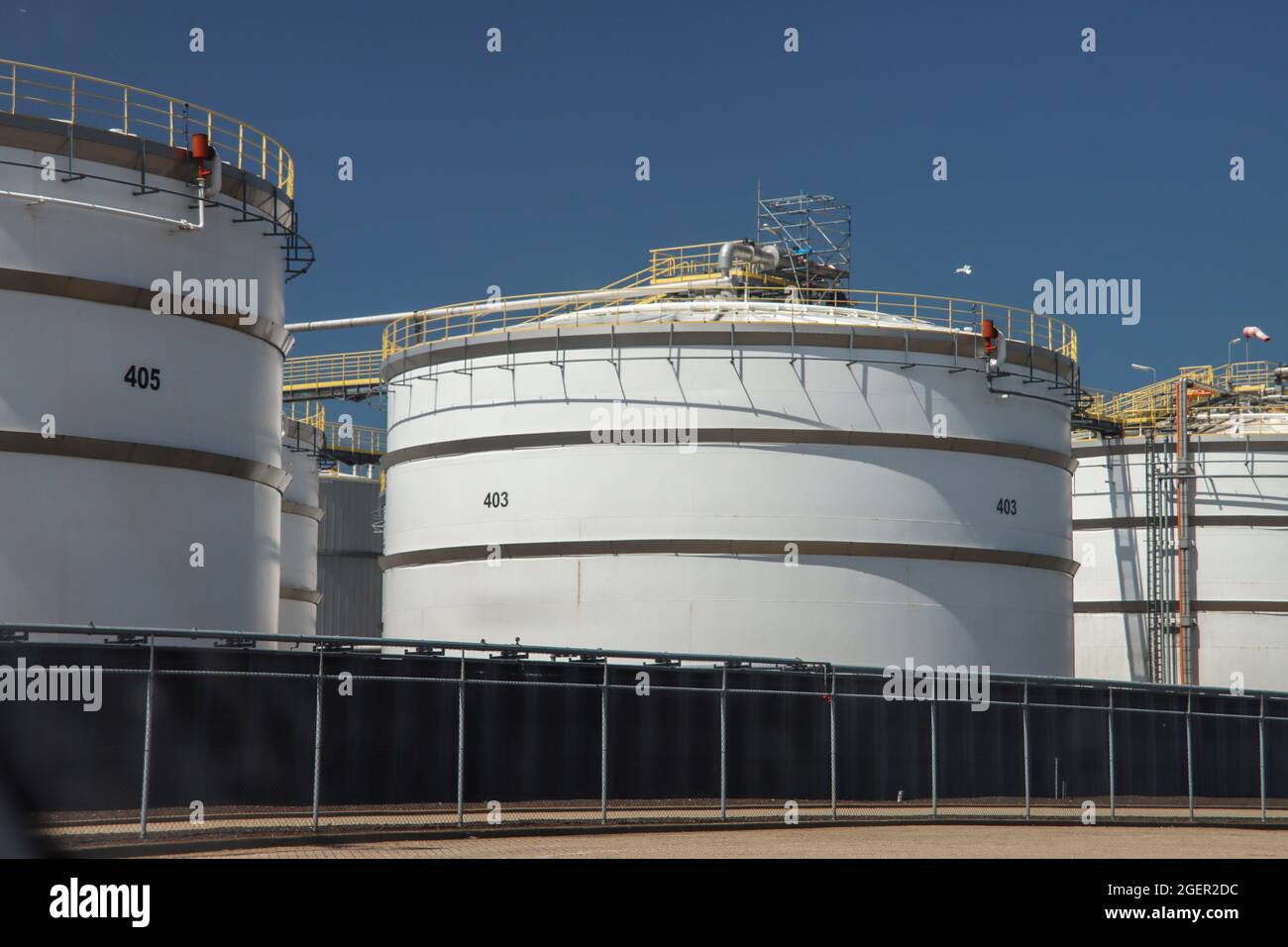Oil storage tanks at the exxonmobil refinery in the Botlek harbor in ...