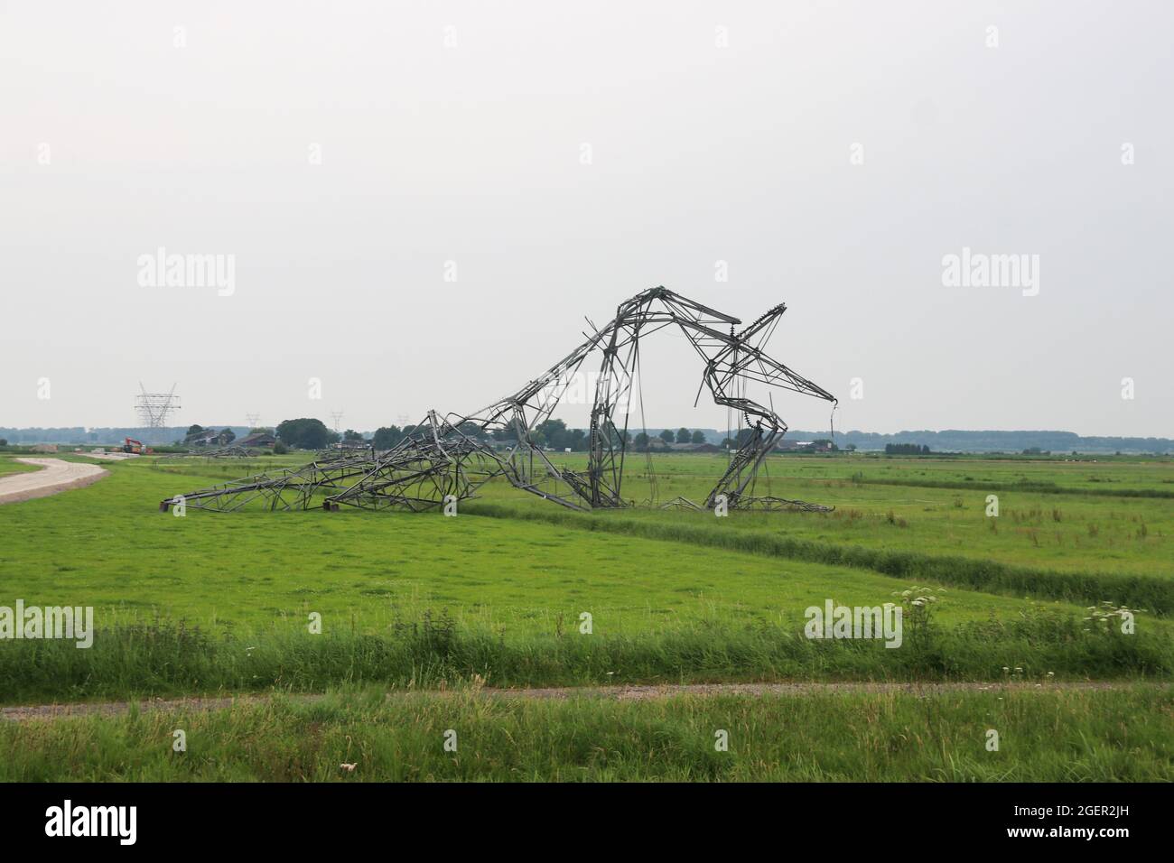 Broken powerlines and steel damage towers after downburst storm in ...