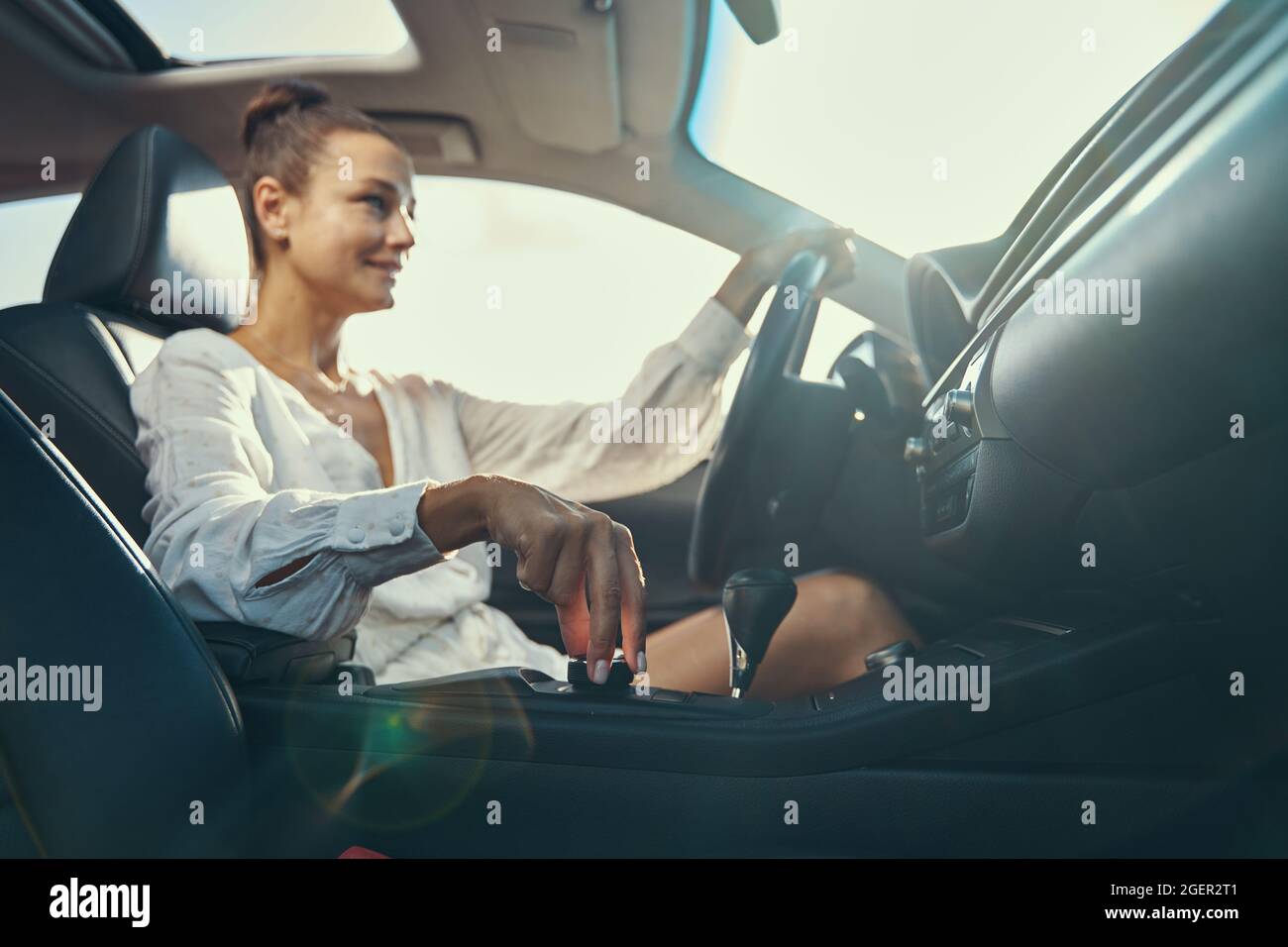 Woman stick shift car hi-res stock photography and images - Alamy