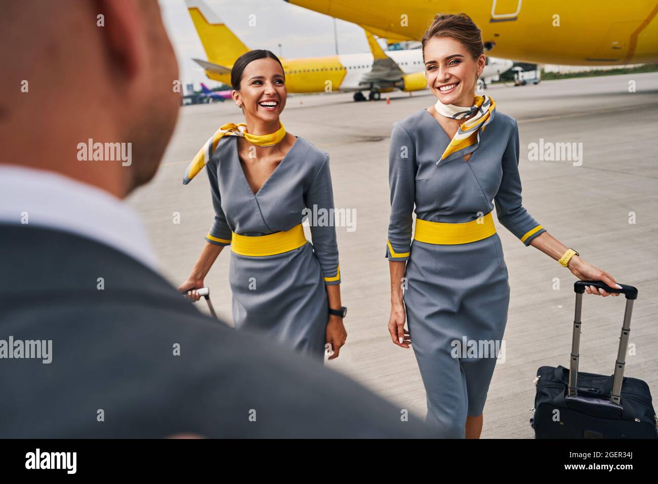 Three aircrew members standing at the airdrome Stock Photo - Alamy