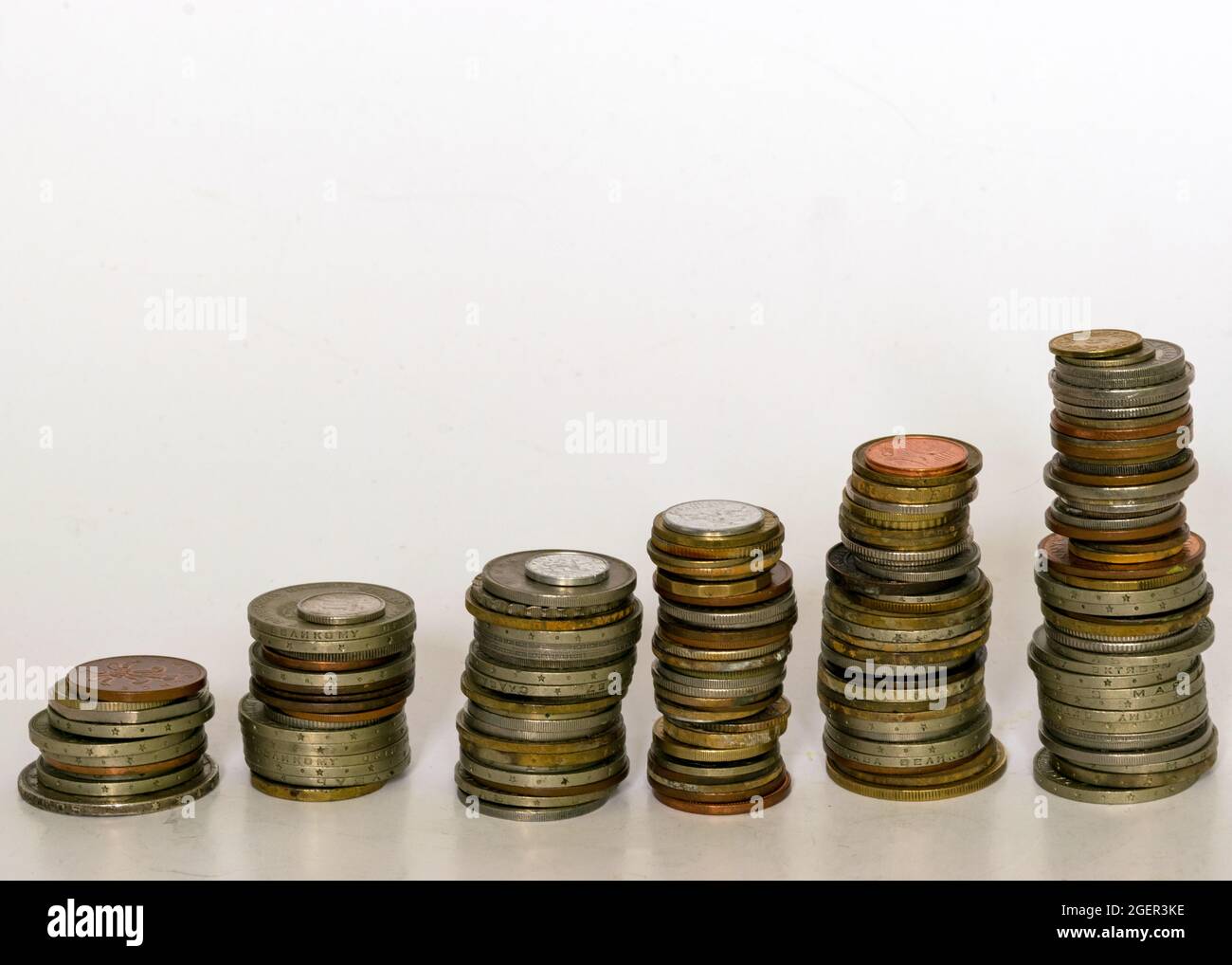 photography with metal coins of different shapes, countries and values ...