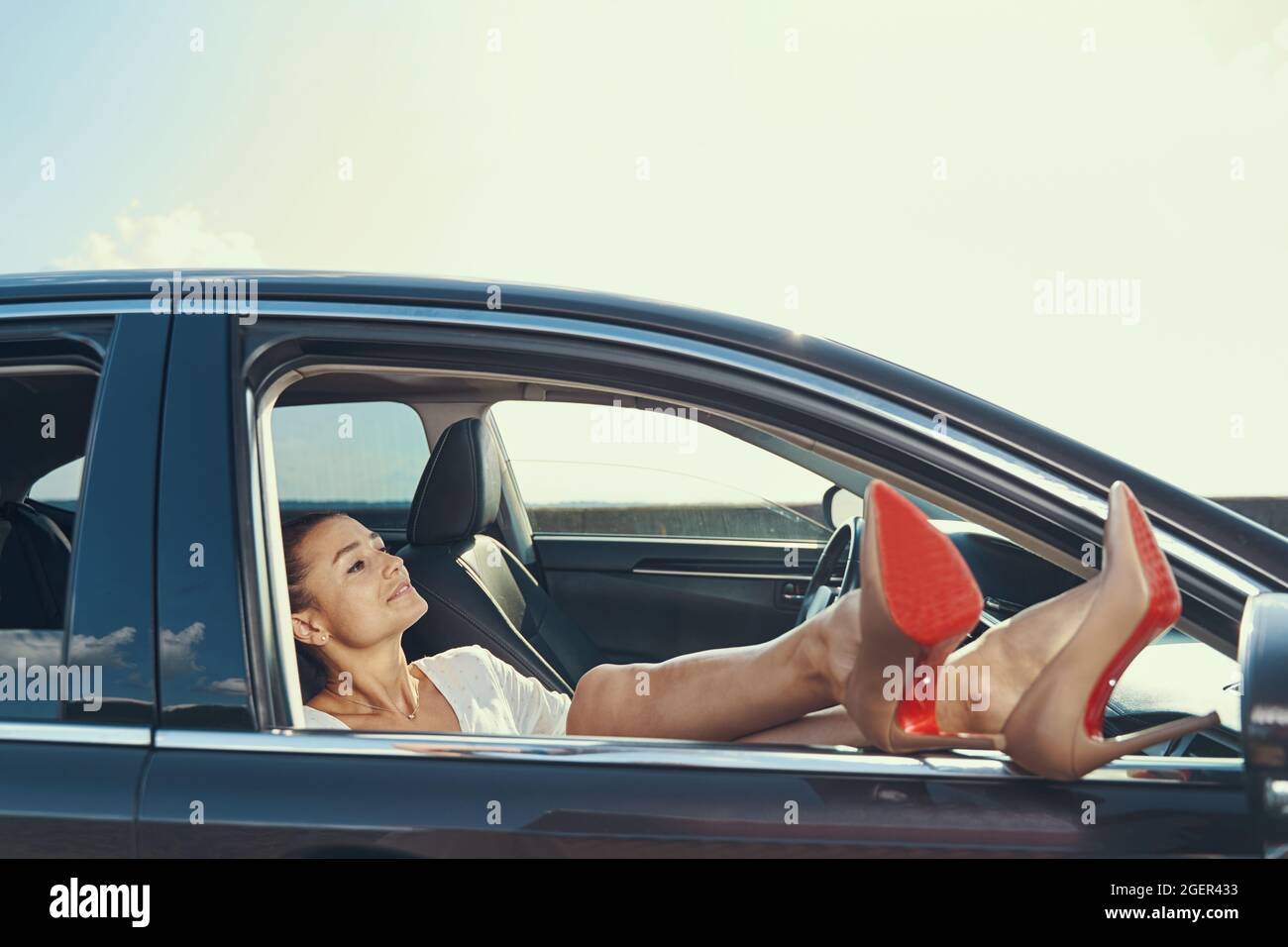 Feet out car window hi-res stock photography and images - Alamy