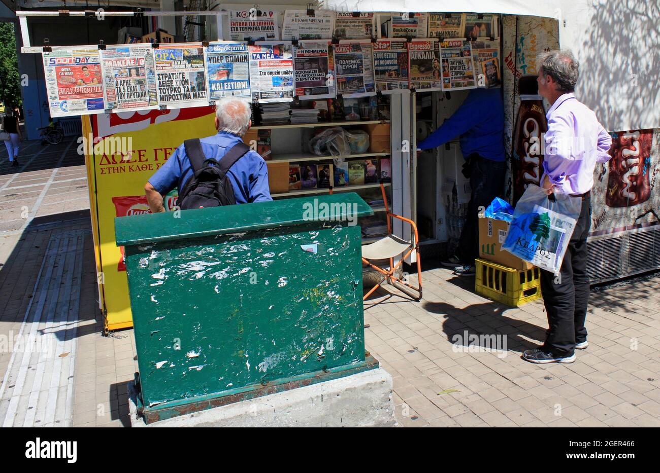 Newspapers at a press kiosk in the center of Athens, Greece, August 11 ...