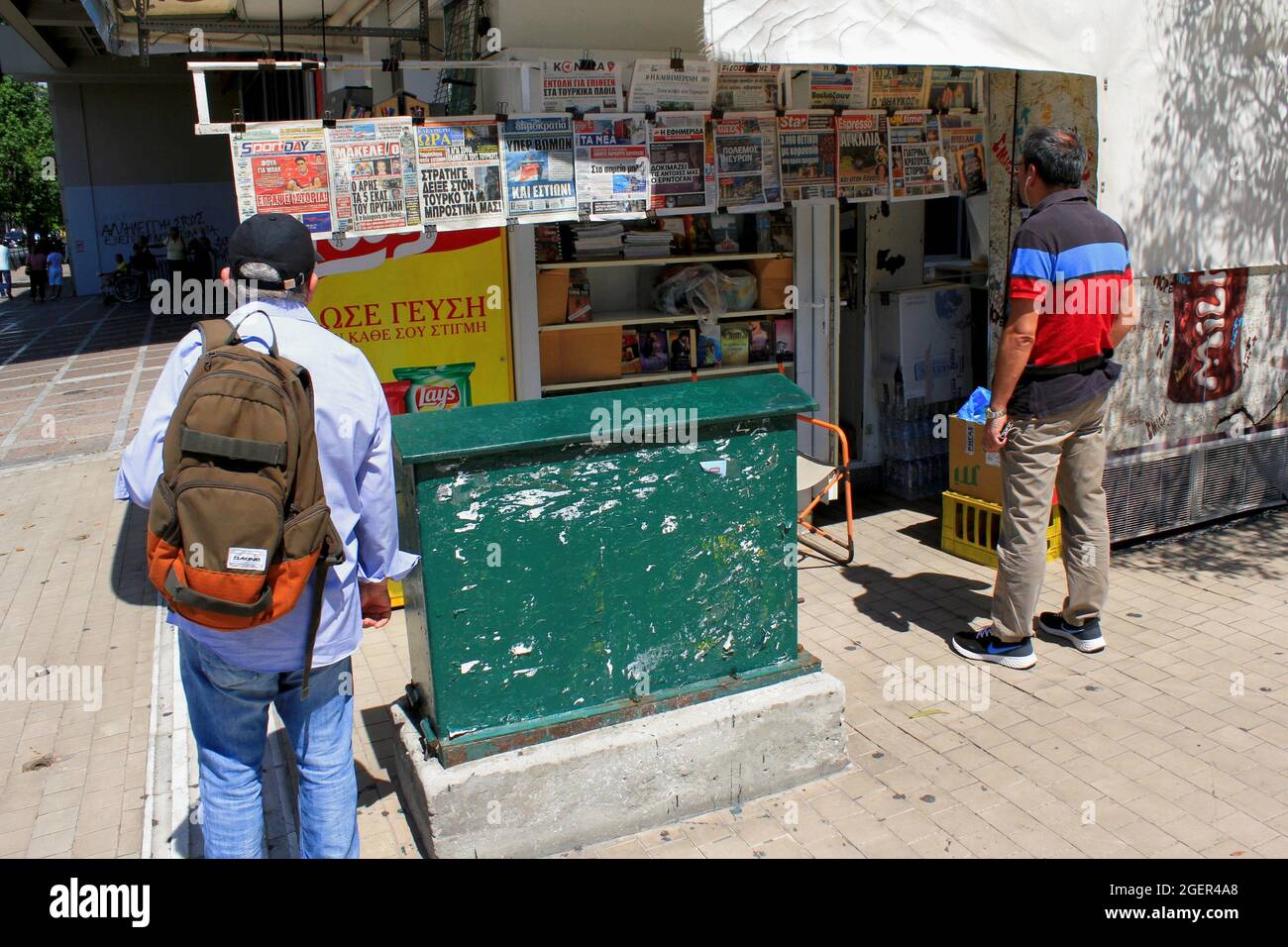 Newspapers at a press kiosk in the center of Athens, Greece, August 11 ...