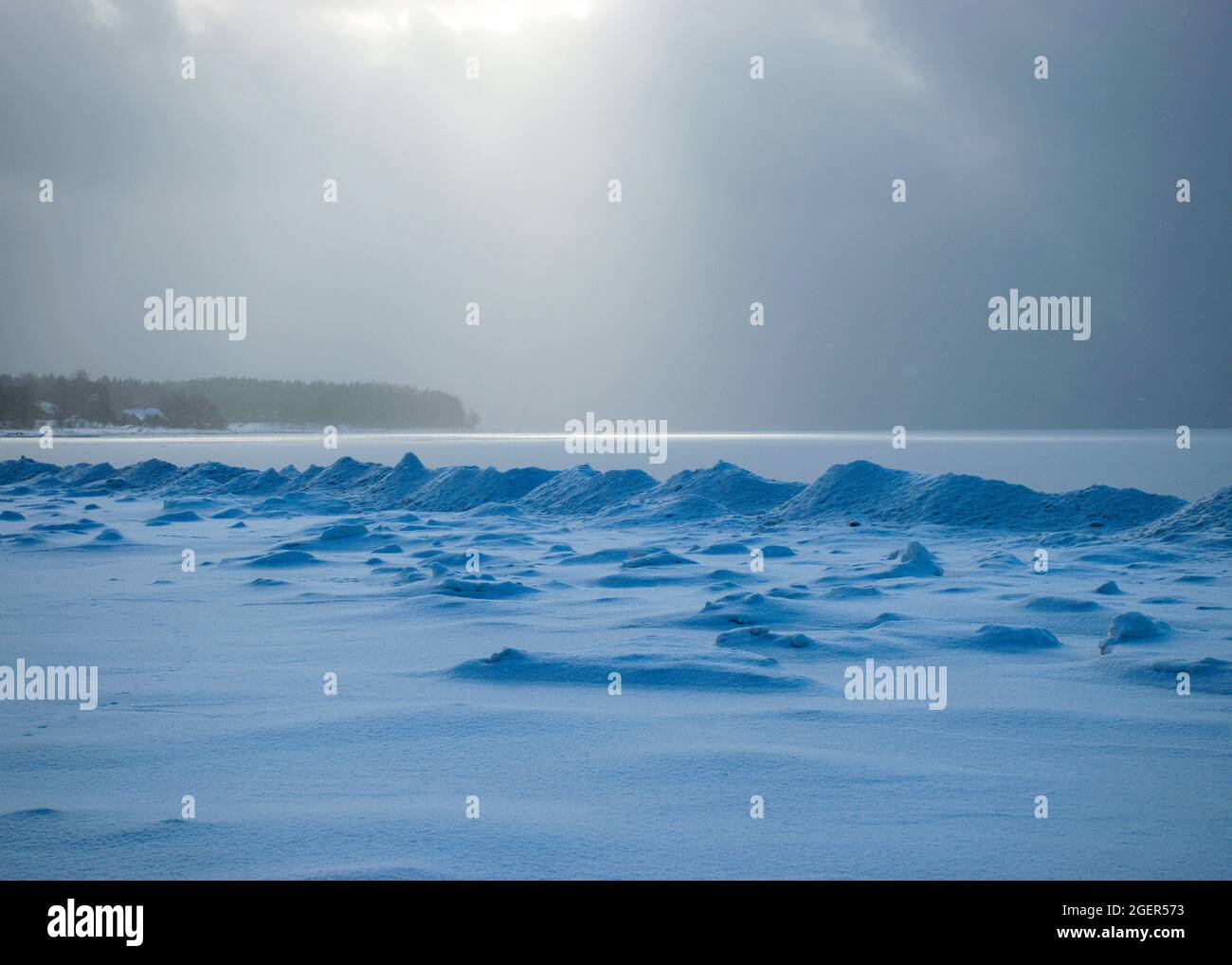 winter landscape by the sea, approaching snowfall, blurred snow ...