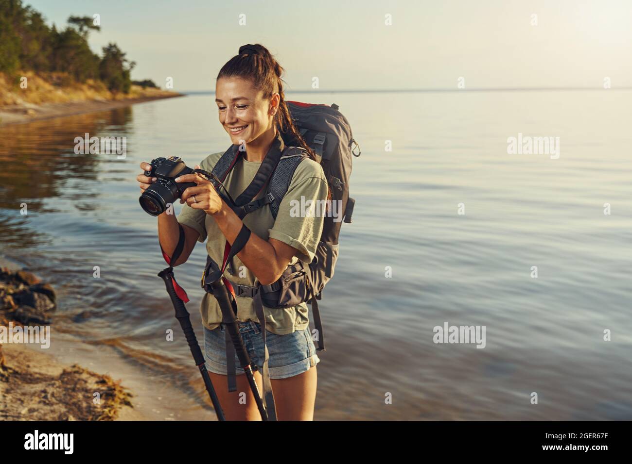 Photographer getting ready to take a shot with camera Stock Photo - Alamy