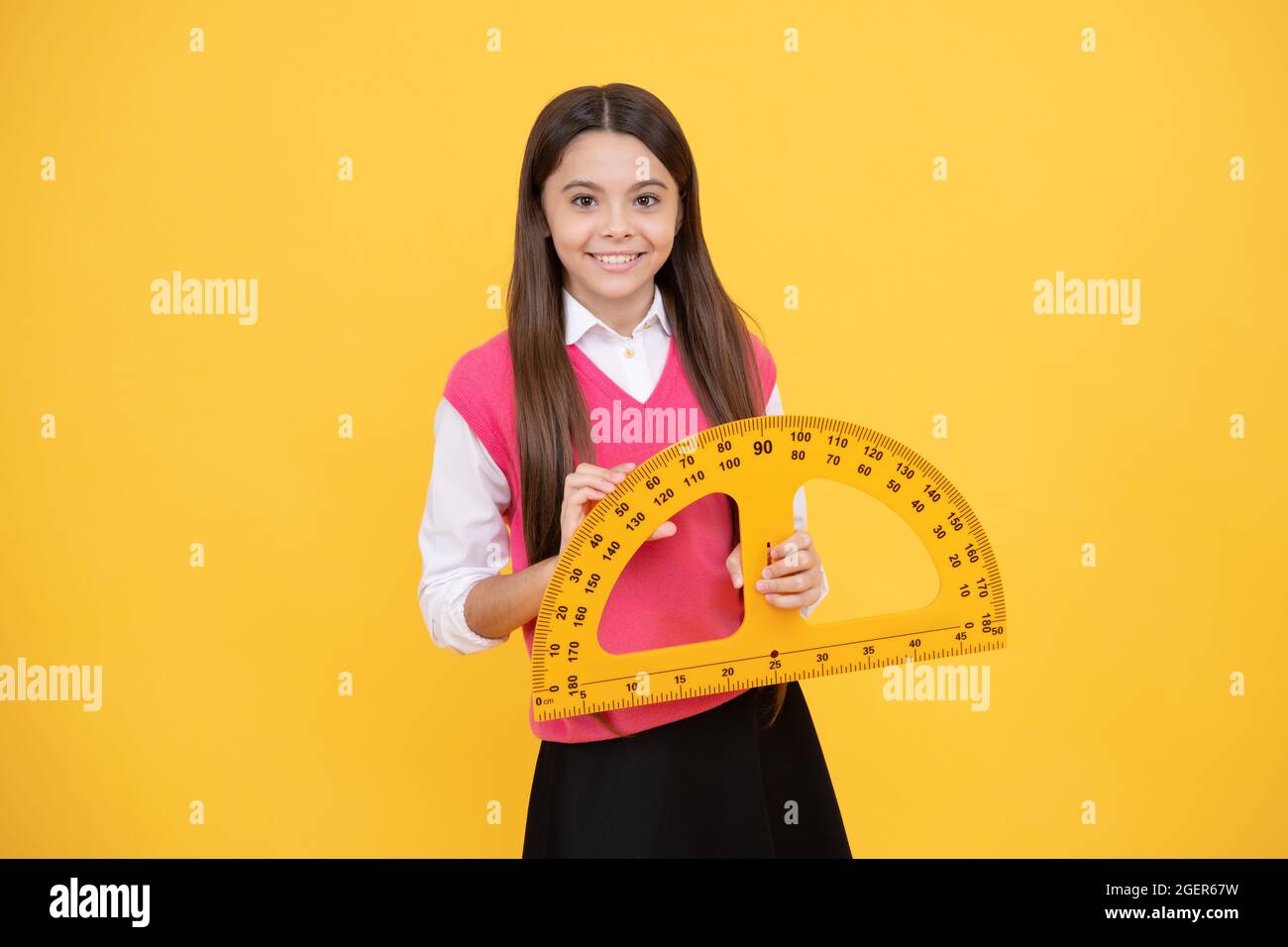Educational concept. measurement. happy teenage girl with protractor ...