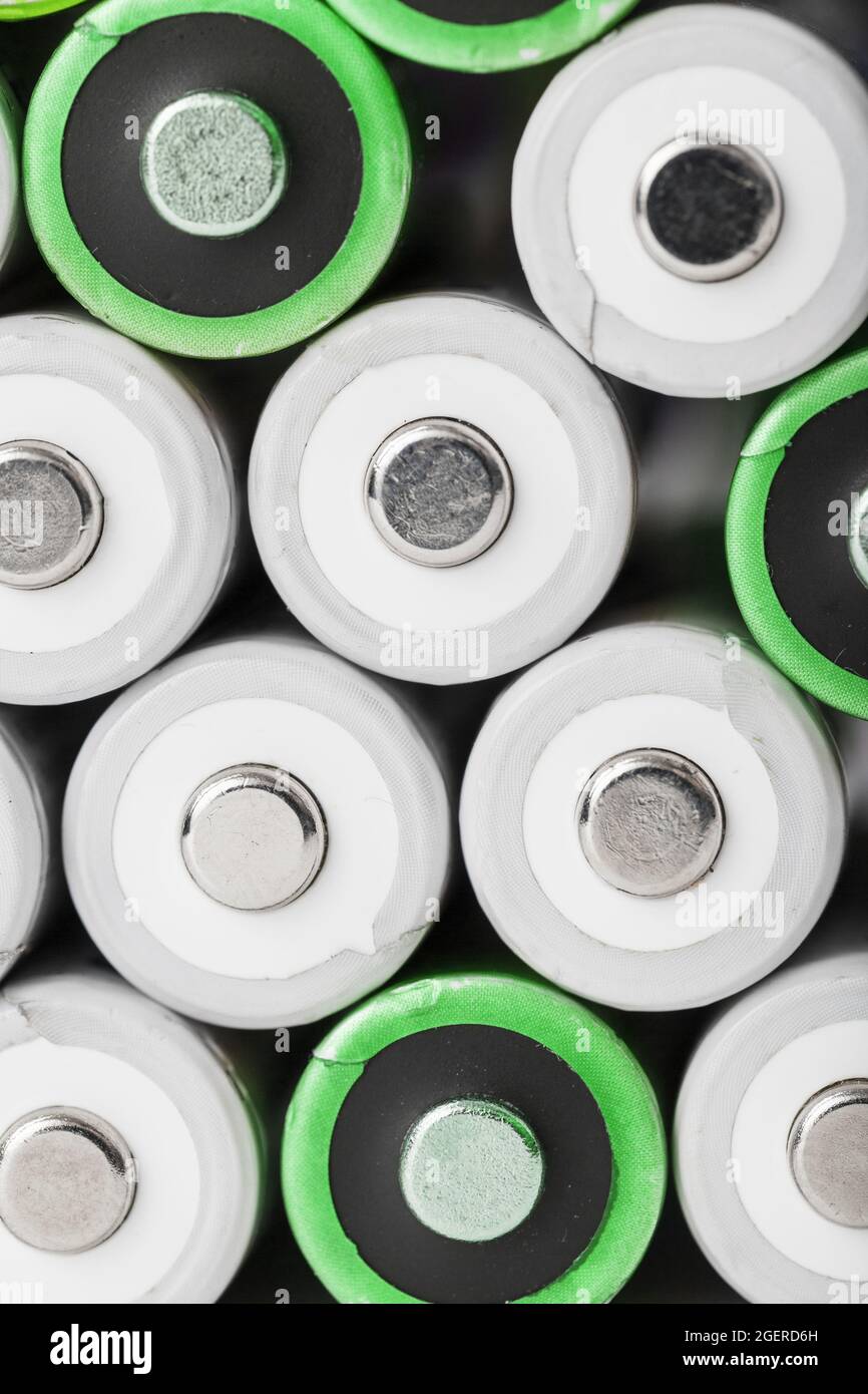 The background is made of AA batteries in full screen. Energy supply ...