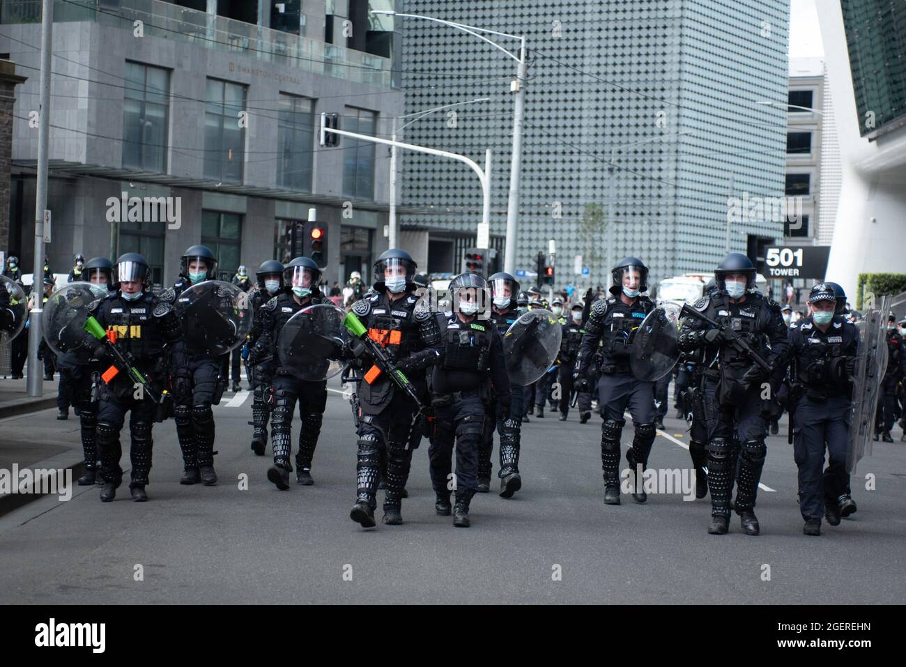 Melbourne, Australia. 21st August 2021. Riot squad officers armed with ...