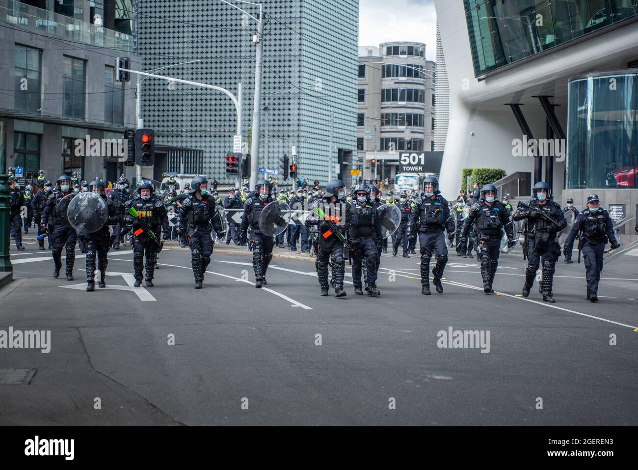 Melbourne, Australia. 21st August 2021. Riot squad officers armed with ...