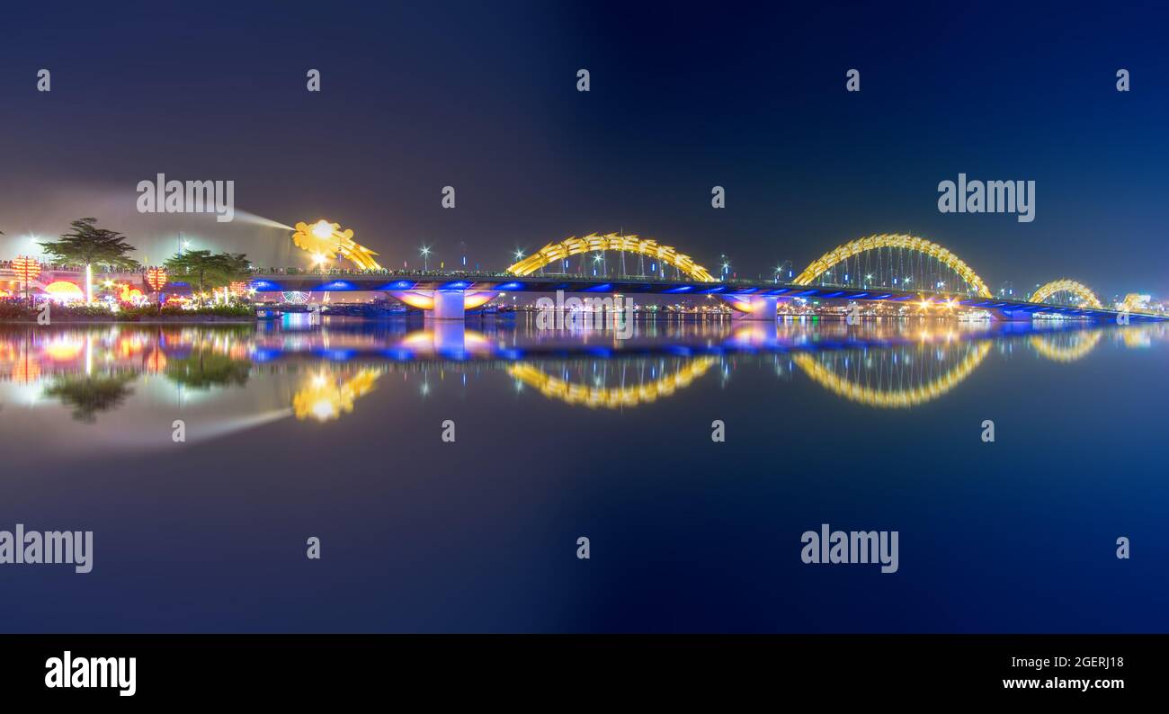 Dragon Bridge in Da Nang at night Stock Photo - Alamy