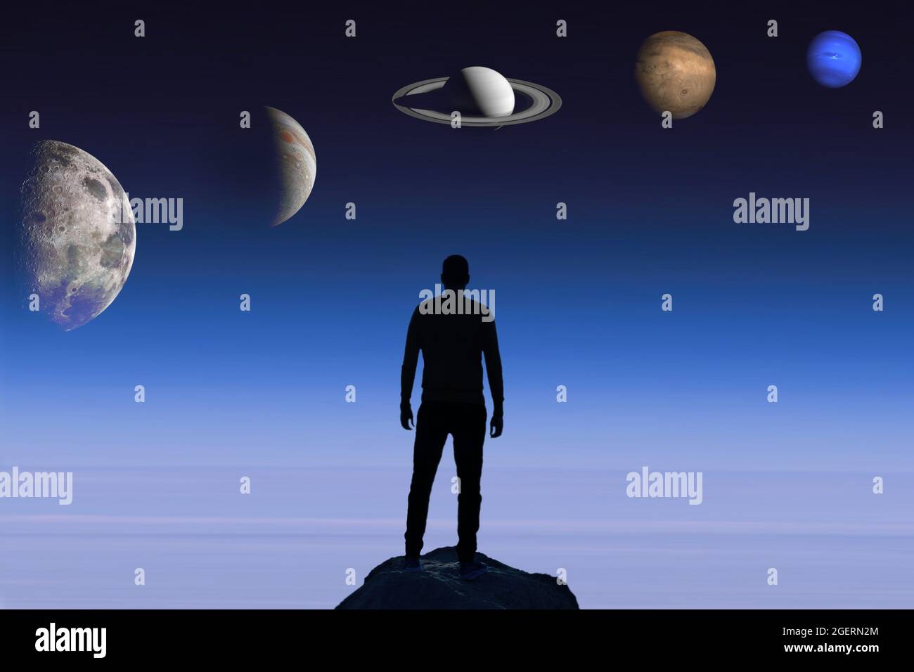 Silhouette of a man on background of the Earth and different planets ...