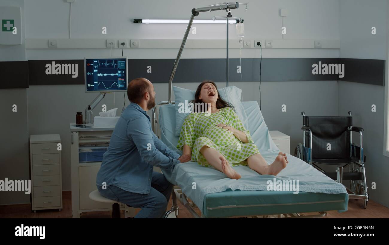 Pregnant wife in pain hi-res stock photography and images - Alamy