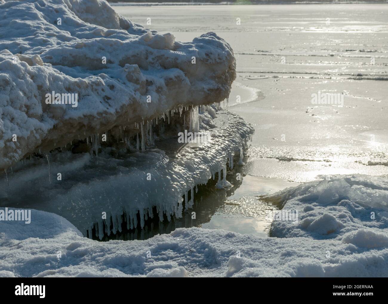 winter landscape by the sea, snowy pieces of ice by the sea and ice ...