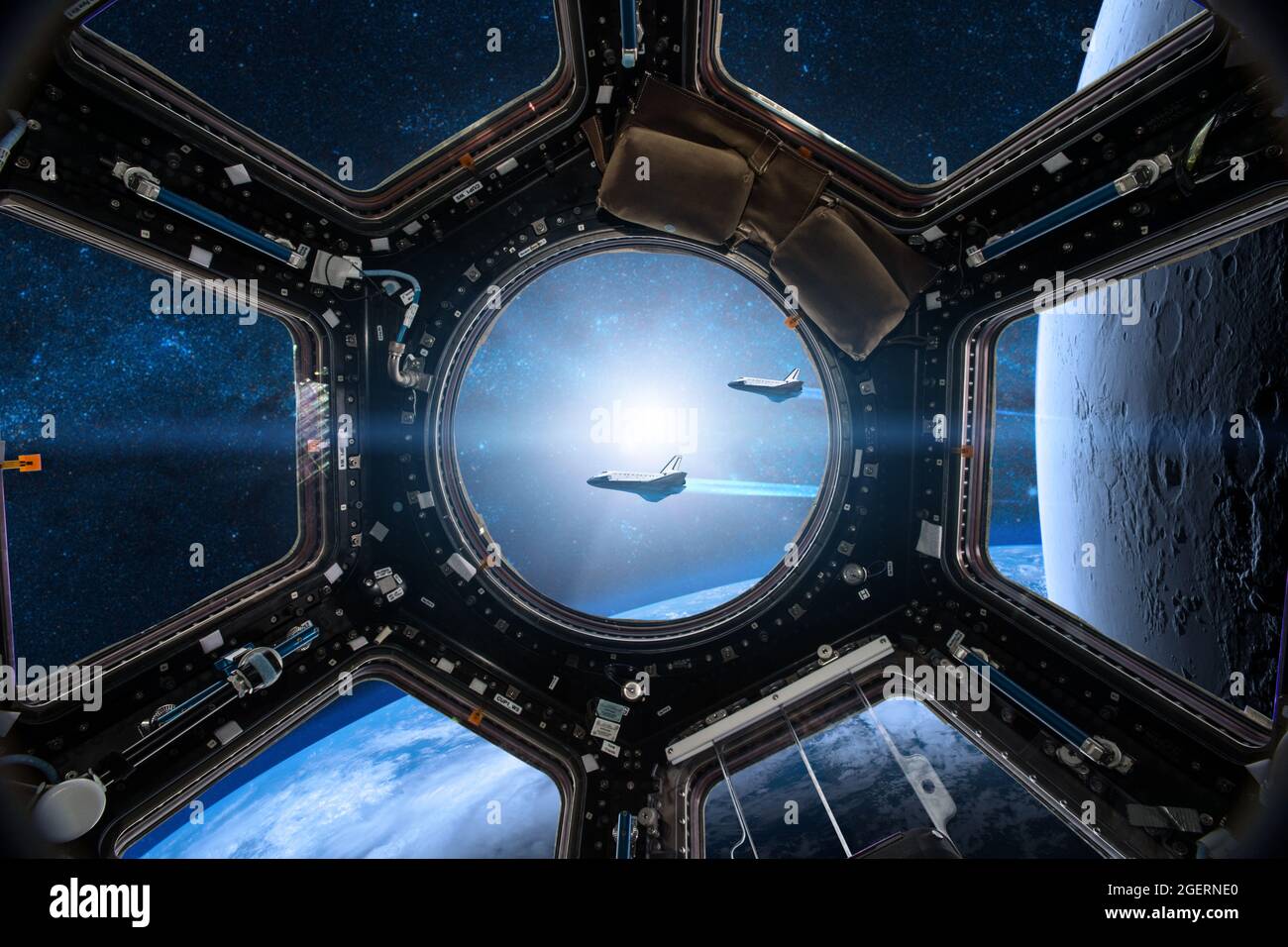 View from a porthole of space station on the Earth background. Elements ...