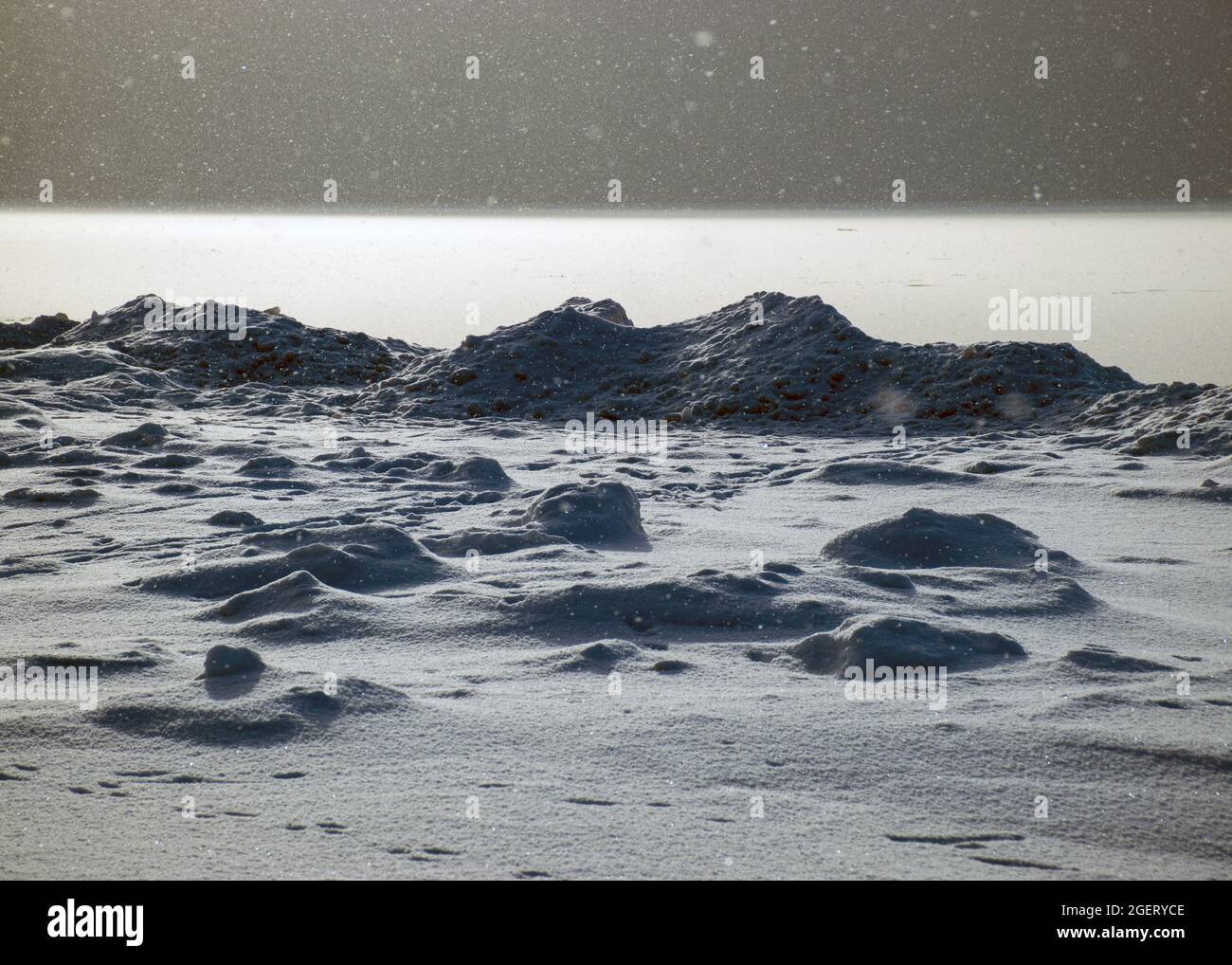 winter landscape by the sea, approaching snowfall, blurred snow ...